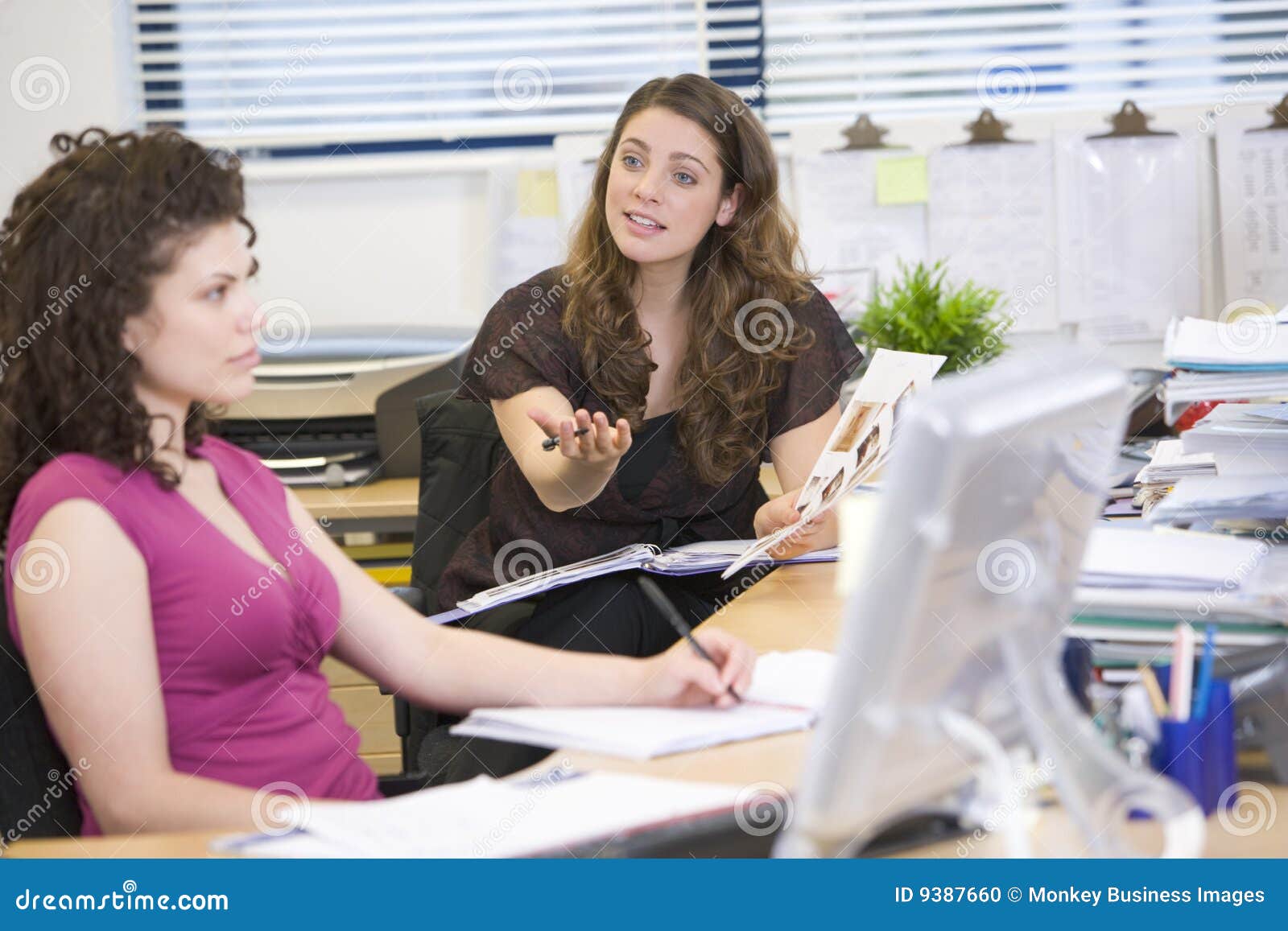 Women Having an Argument at Work Stock Photo - Image of color, table ...