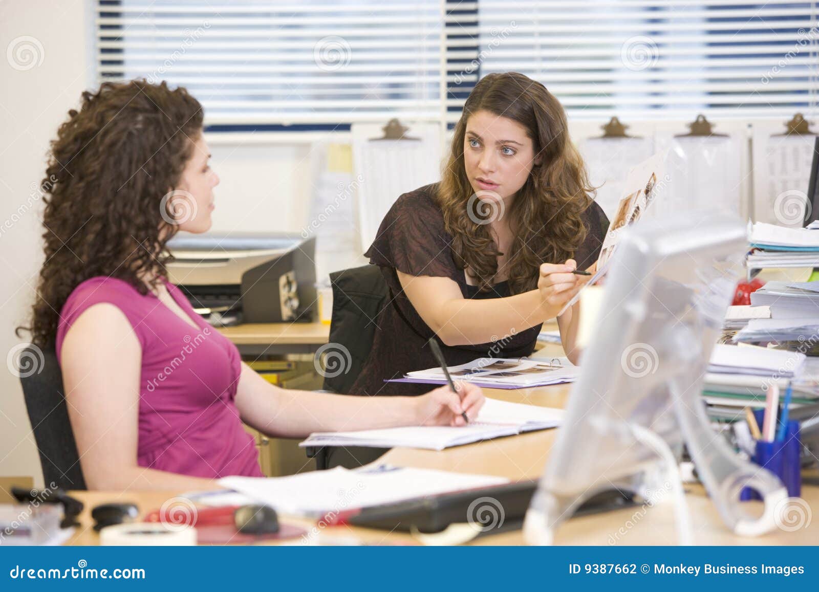 Women Having an Argument at Work Stock Photo - Image of working, paper ...