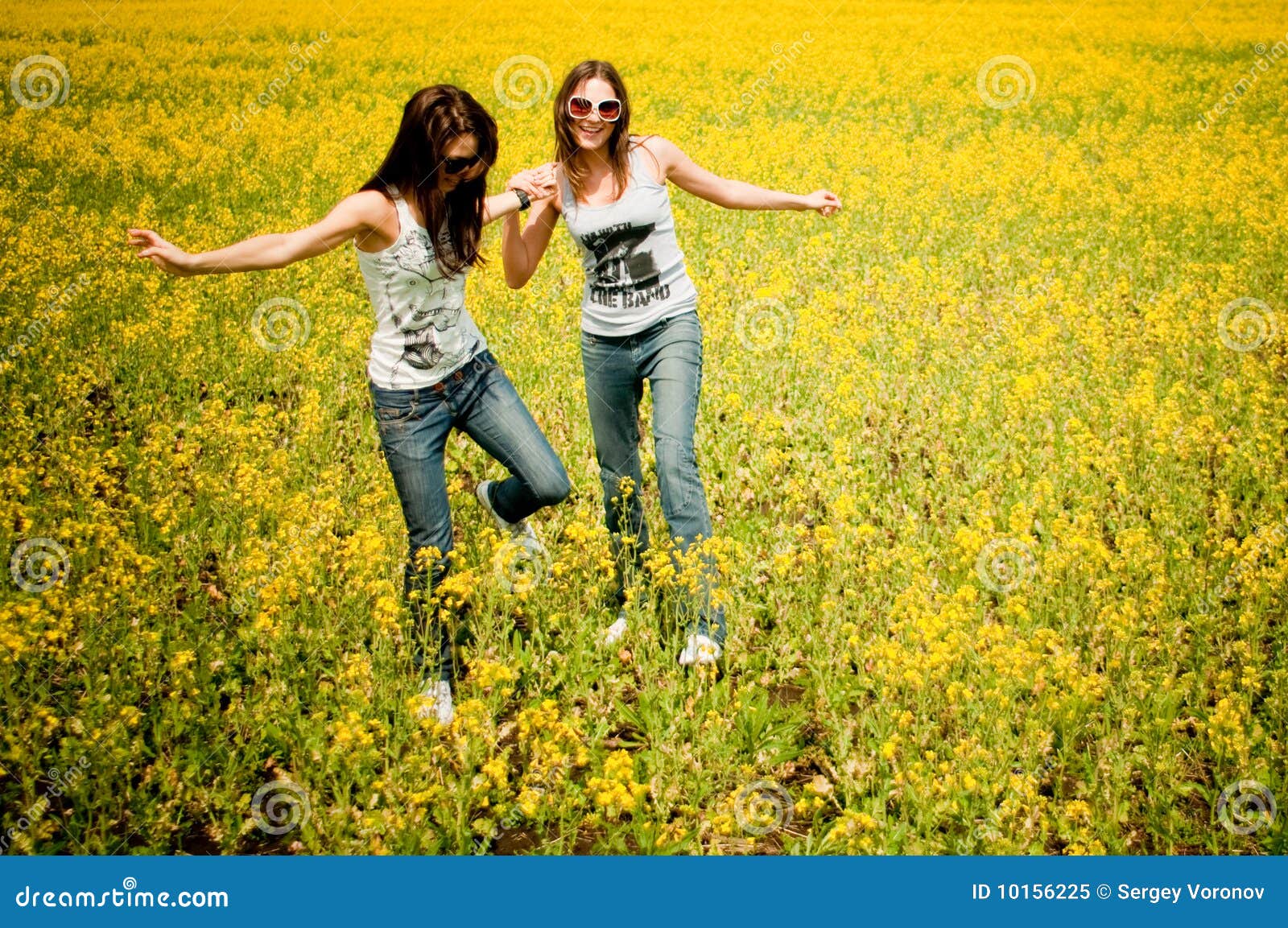 Women Having Fun In The Field Stock Image | CartoonDealer.com #10156225