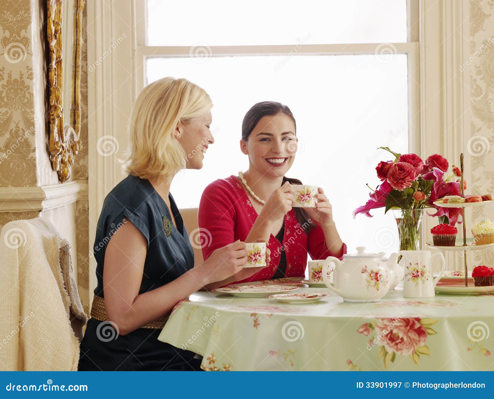 Women Having Tea at Dining Table Stock Image - Image of happiness ...