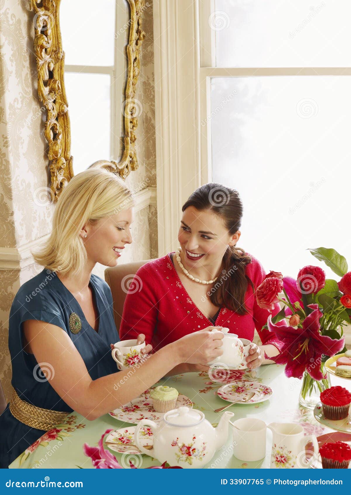 Women Having Tea at Dining Table Stock Image - Image of room, dining ...