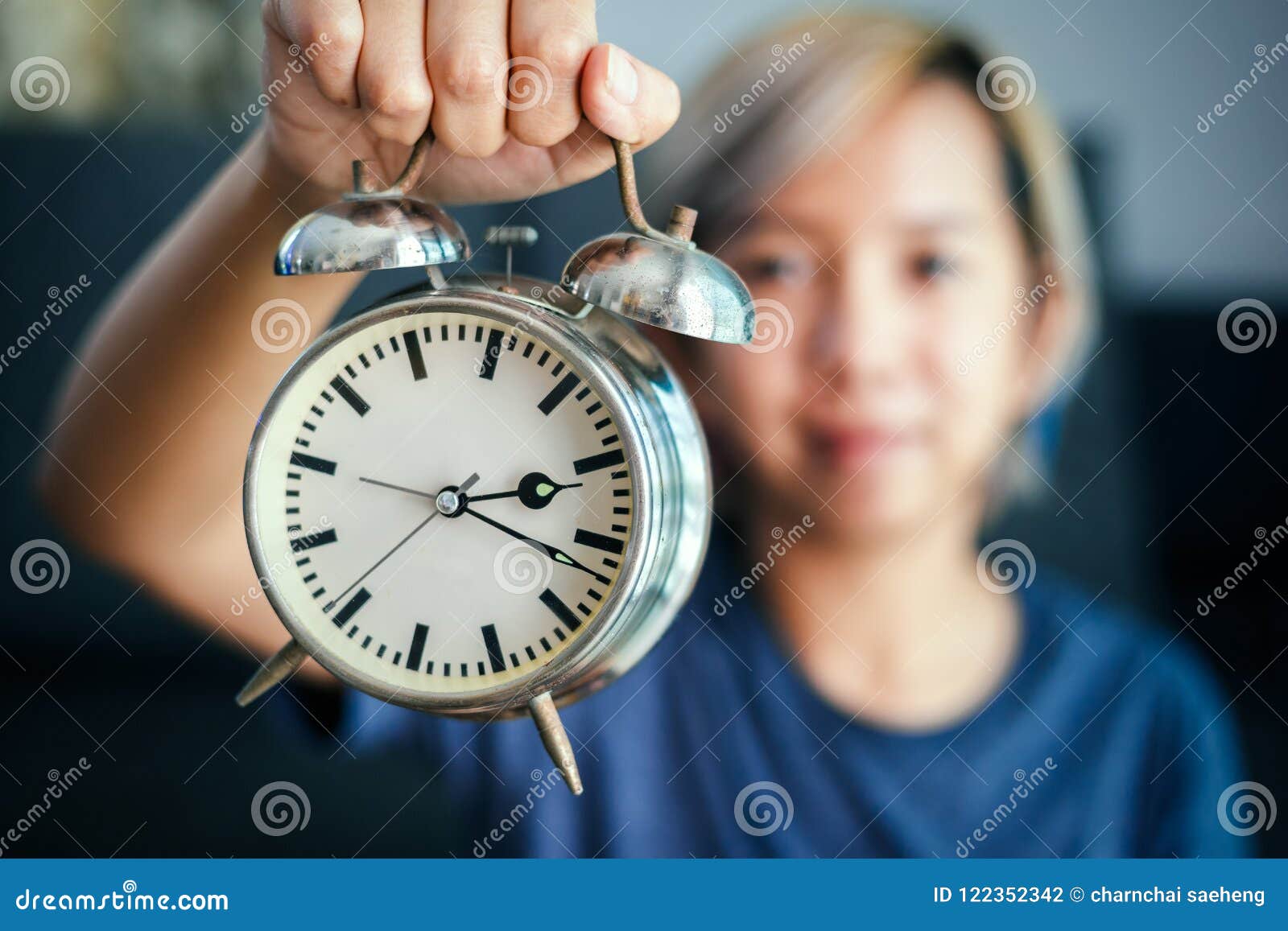 Women hold clock in hand. stock photo. Image of rest - 122352342