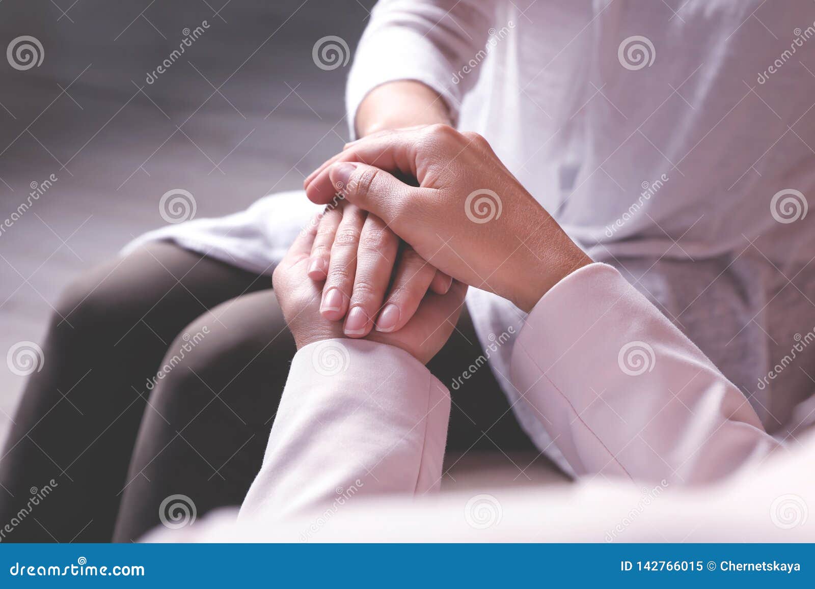 Women Holding Hands Indoors. Concept of Support and Help Stock Image ...