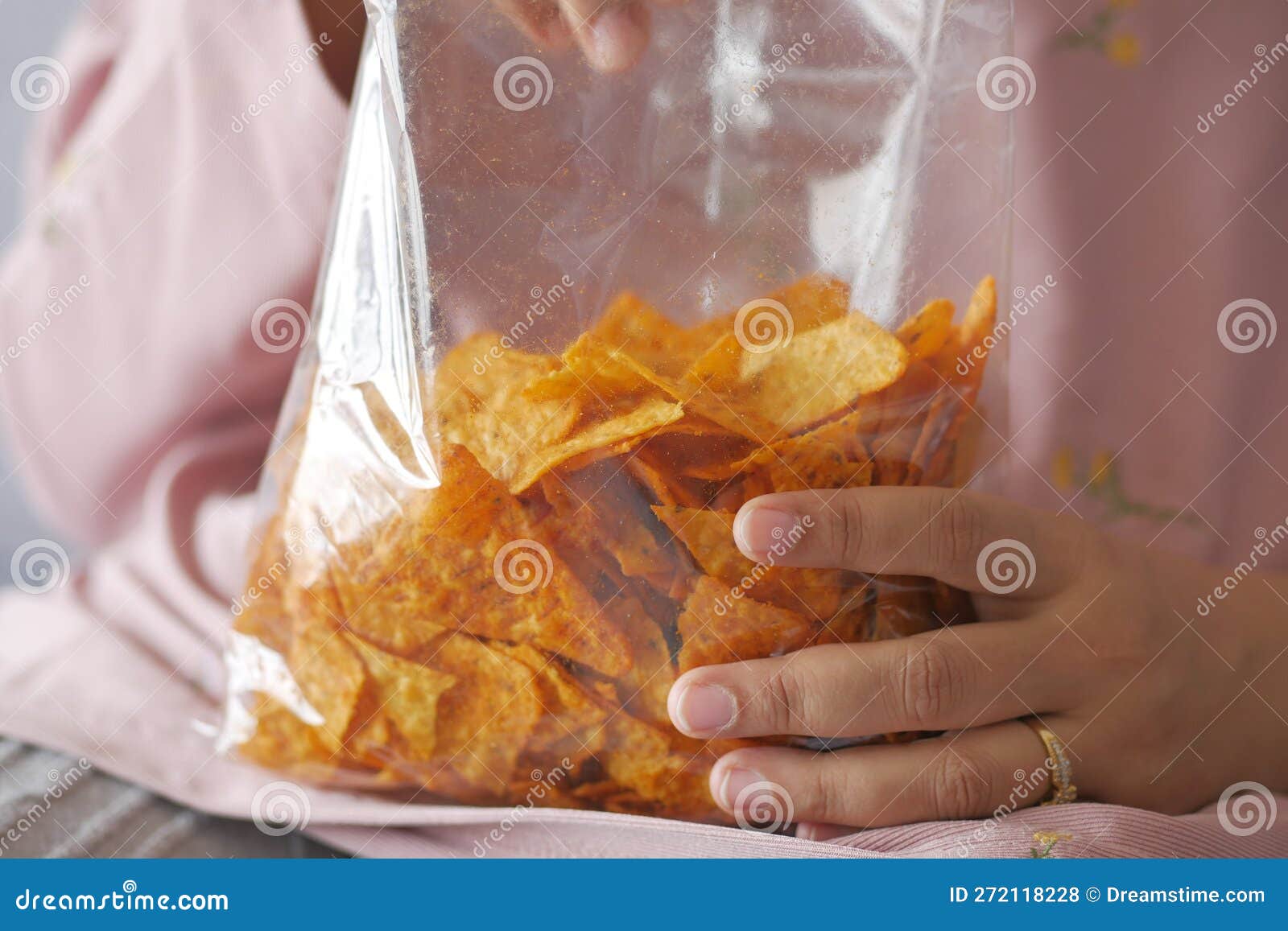 Women Holding a Open Potato Chips Packet Stock Photo - Image of plastic ...