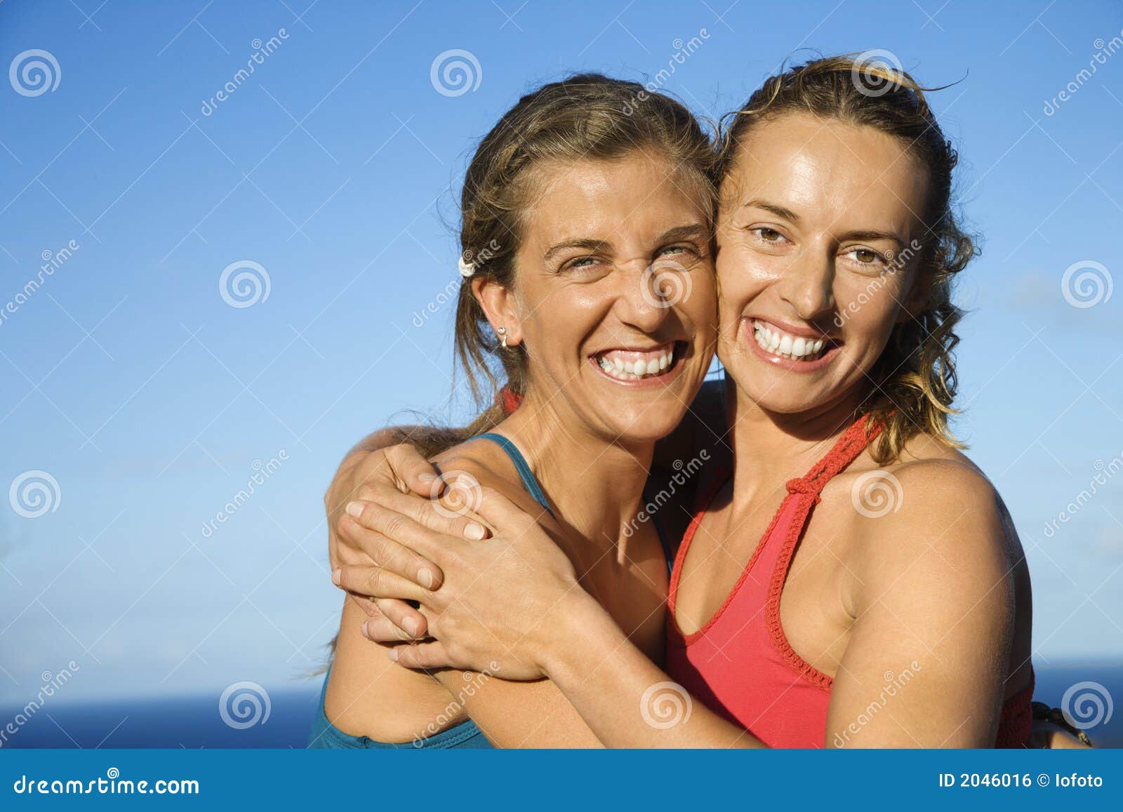 Women hugging. stock photo. Image of hugging, color, outdoors - 2046016