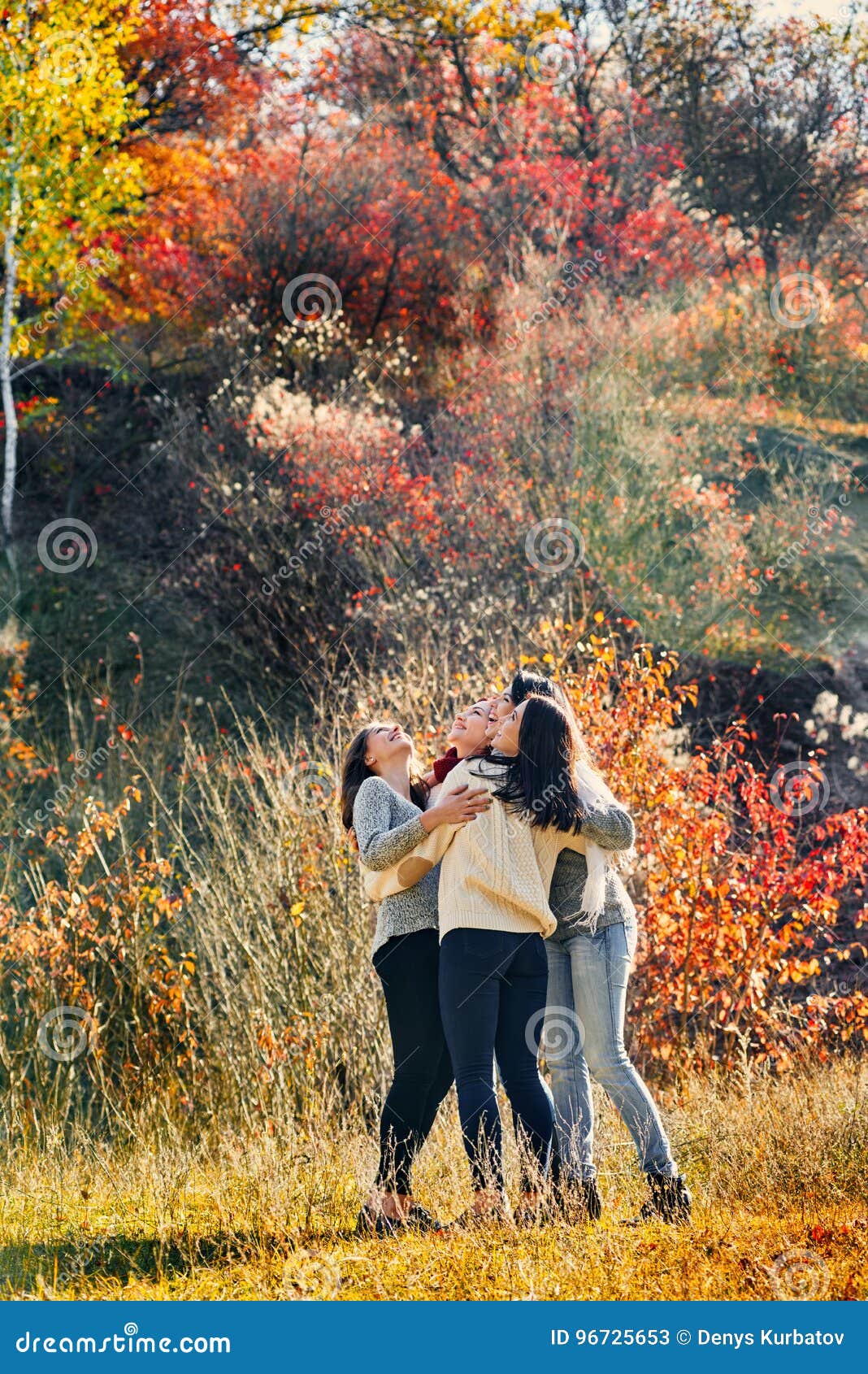 Women hugging outdoors stock image. Image of female, october - 96725653