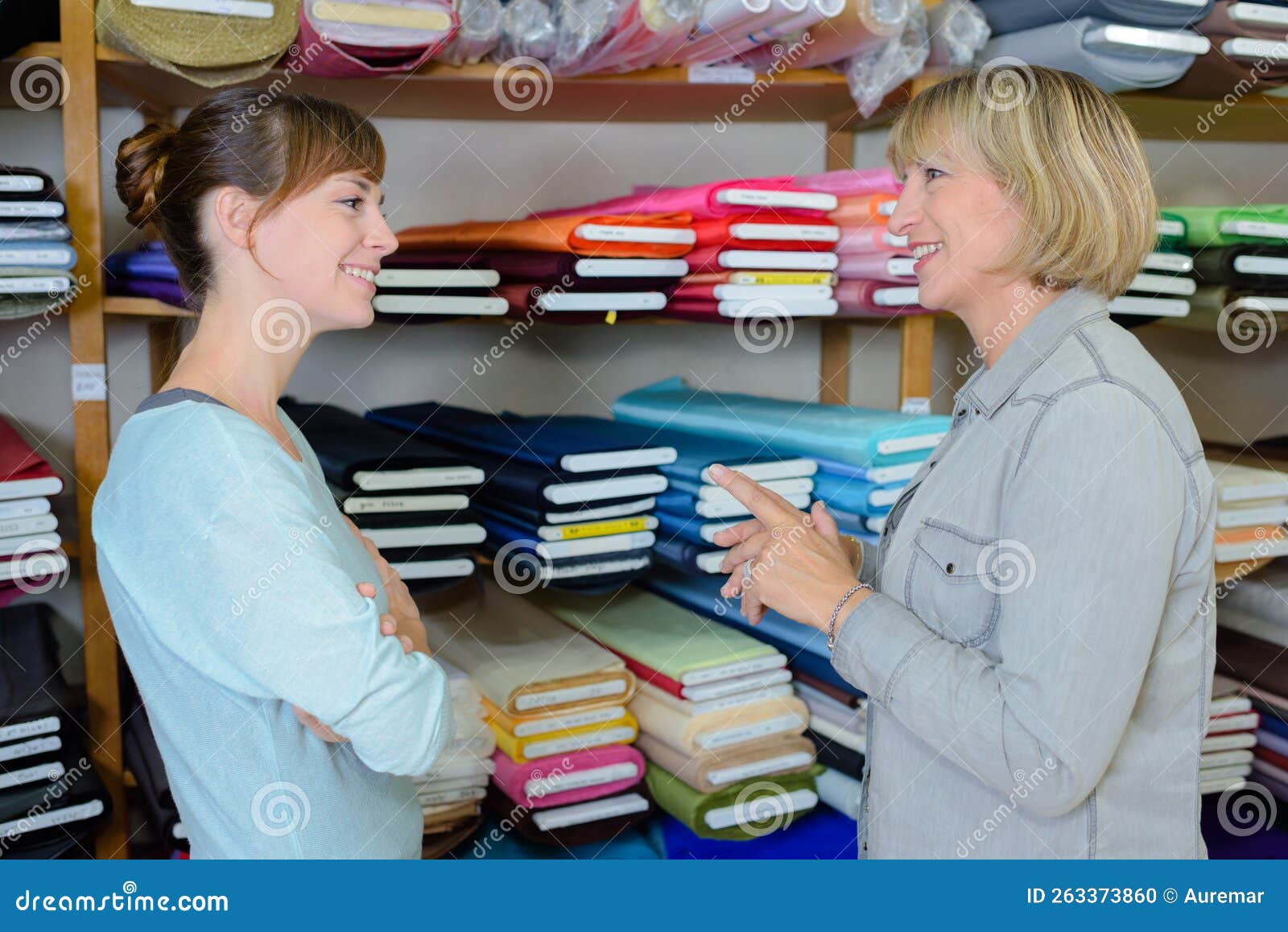 Women inside textile shop stock photo. Image of exclusive - 263373860