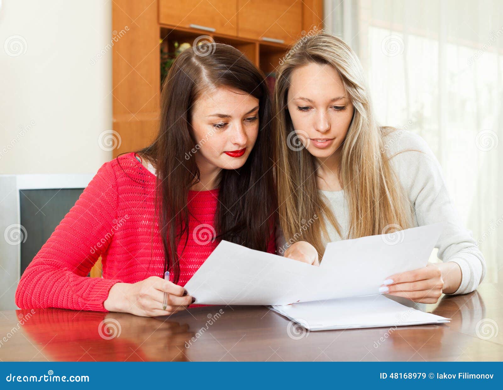 Women Looking Financial Documents Stock Image - Image of finance ...