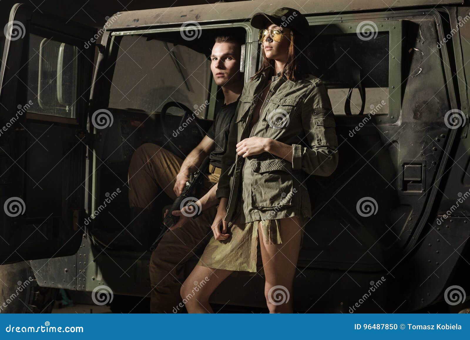 Women and Men Standing Near Tank. Stock Photo - Image of slim, body ...