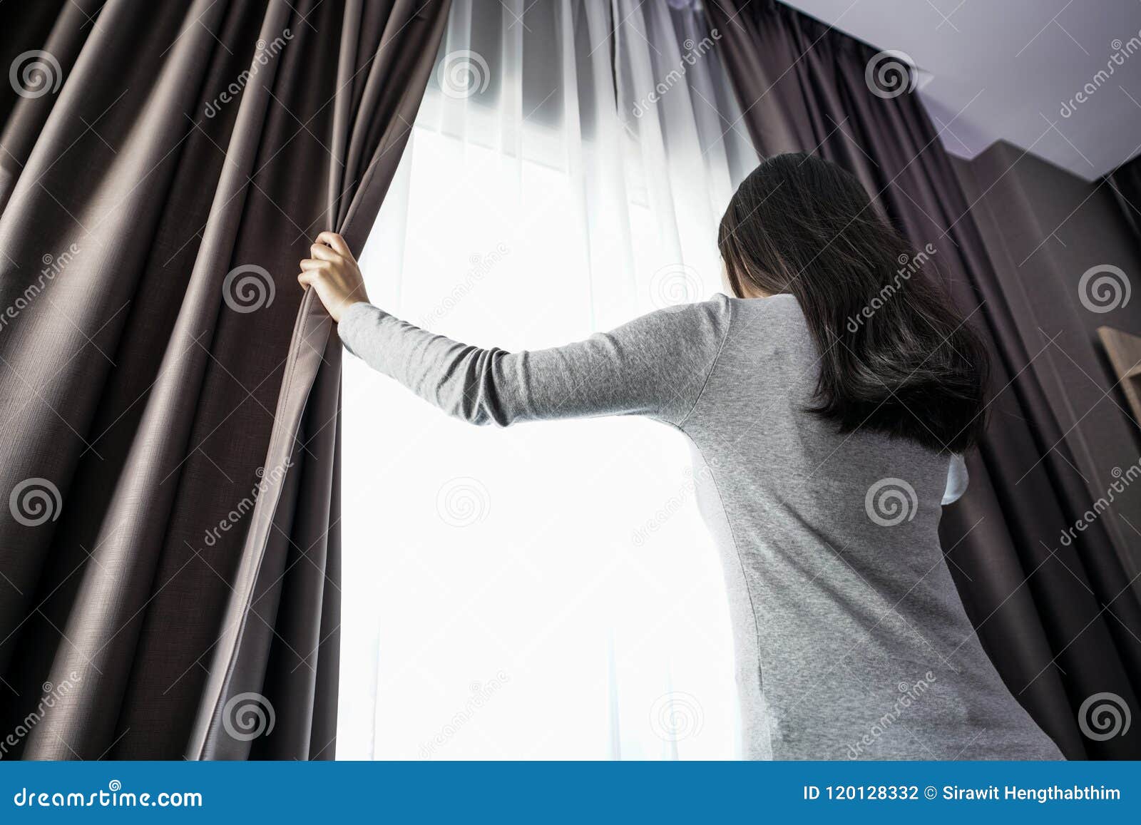 Women opening curtain stock photo. Image of house, fabric - 120128332