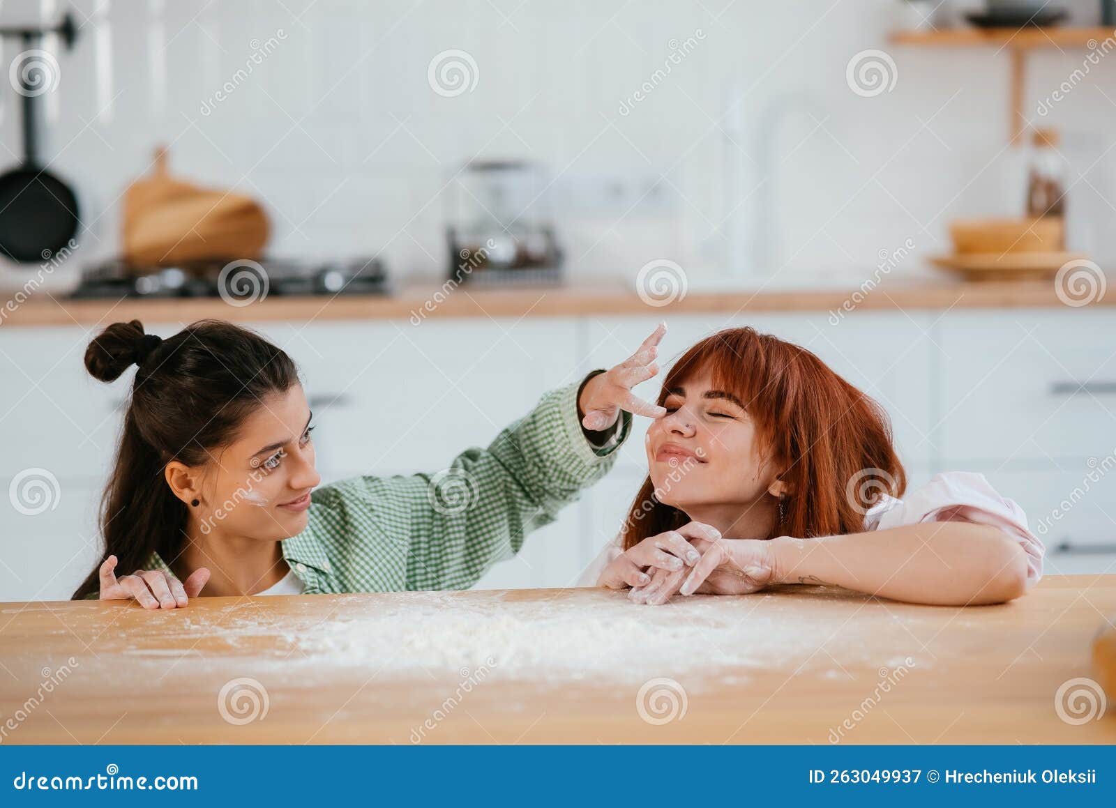 Two Beautiful Women Play with Flour in the Kitchen Stock Image - Image ...