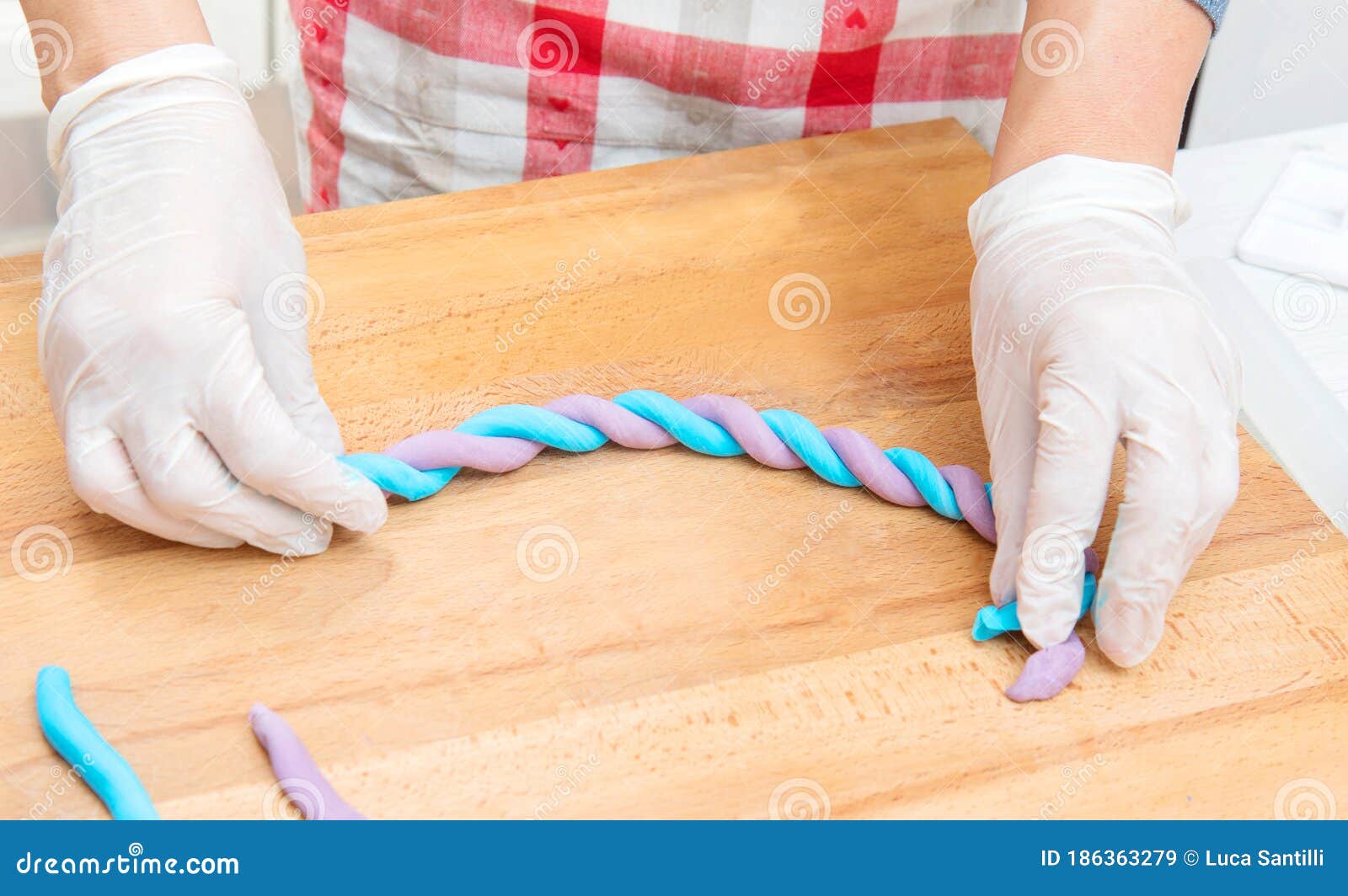 Women Preparing and Decorating a Cake with Sugar Paste Stock Image ...