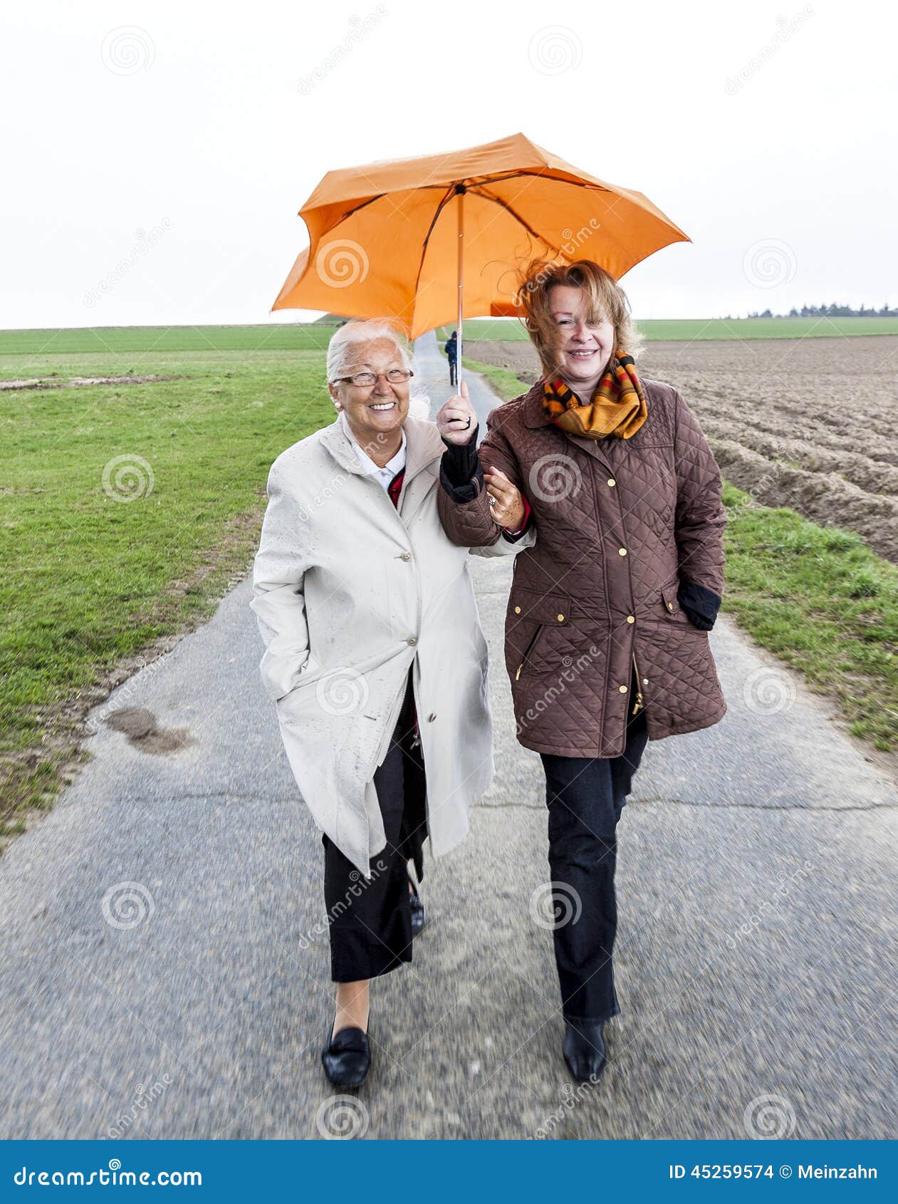 Women in Rain Under an Umbrella Stock Photo - Image of umbrella, love ...