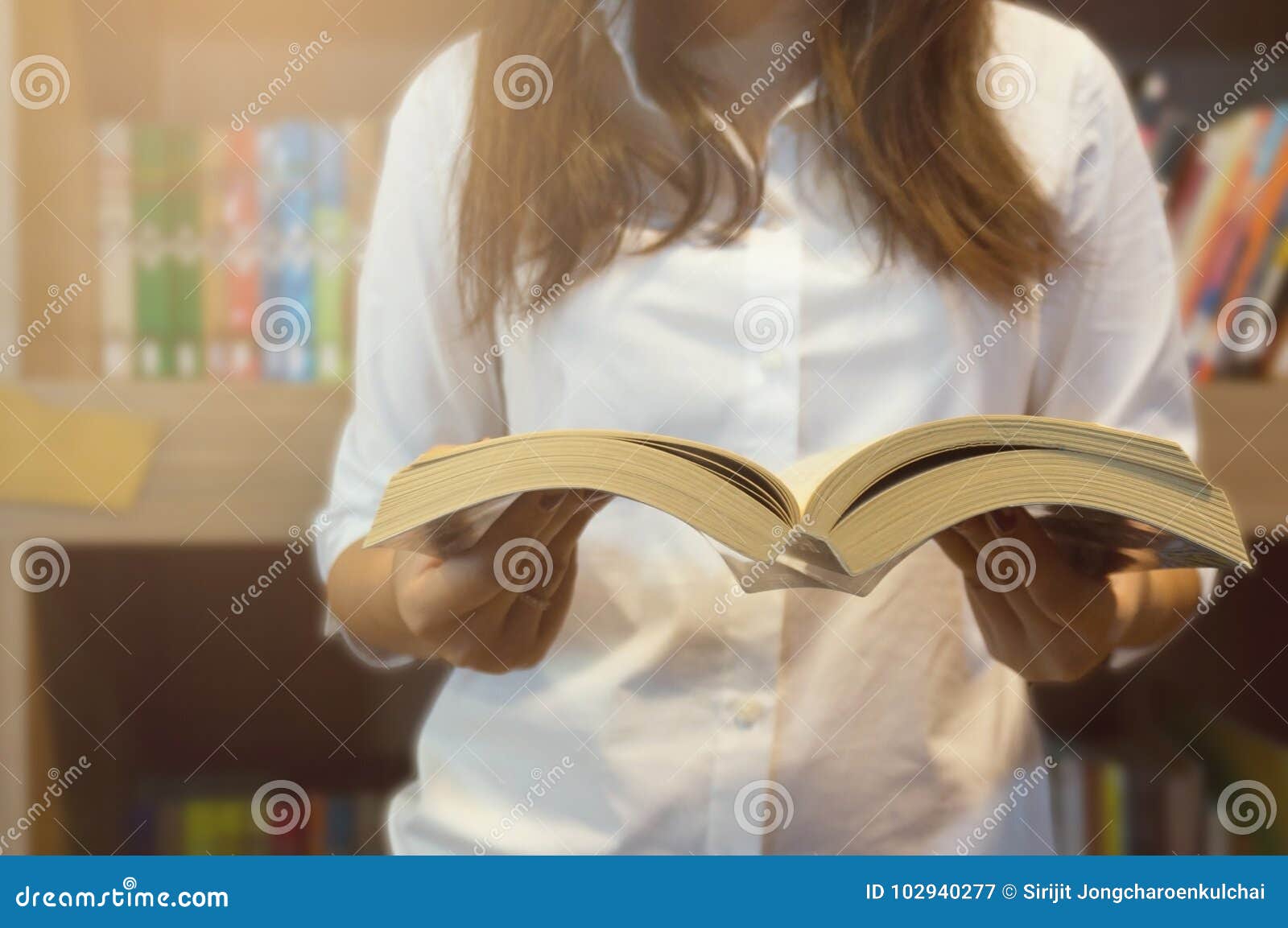 Women Reading Book and Relaxing in Library. Selective Focus Stock Image ...