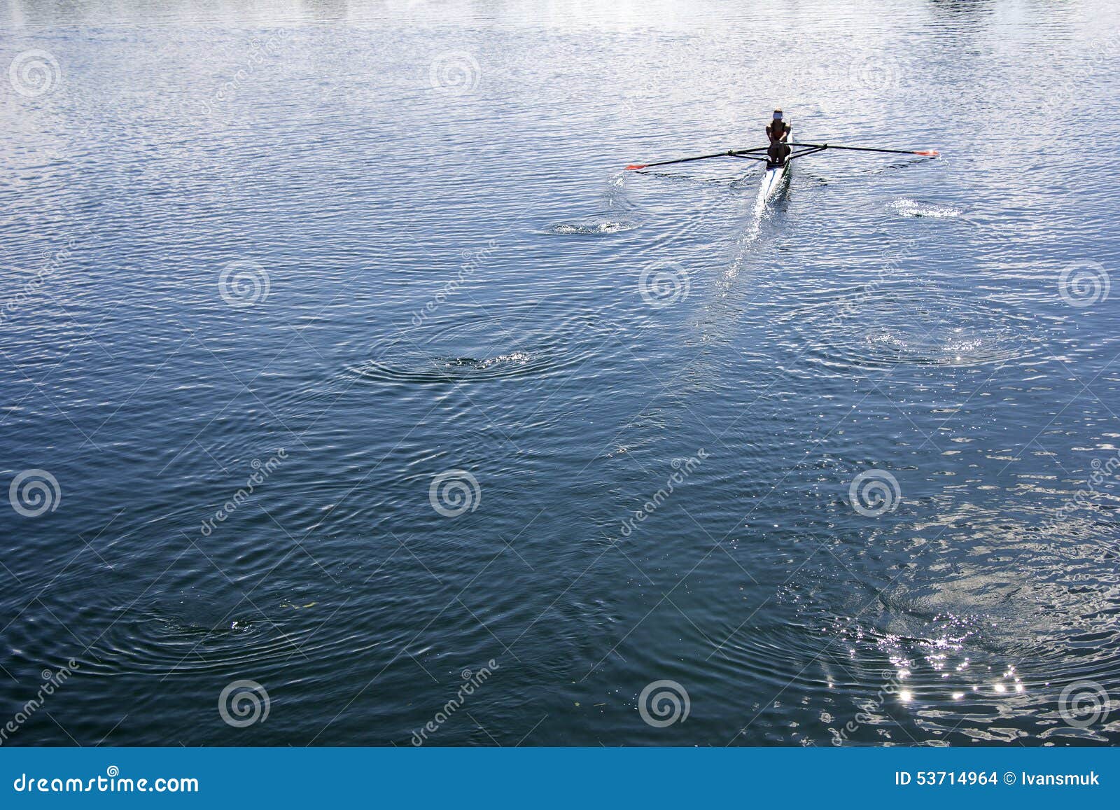 Women rowing in a lake editorial stock image. Image of scull - 53714964