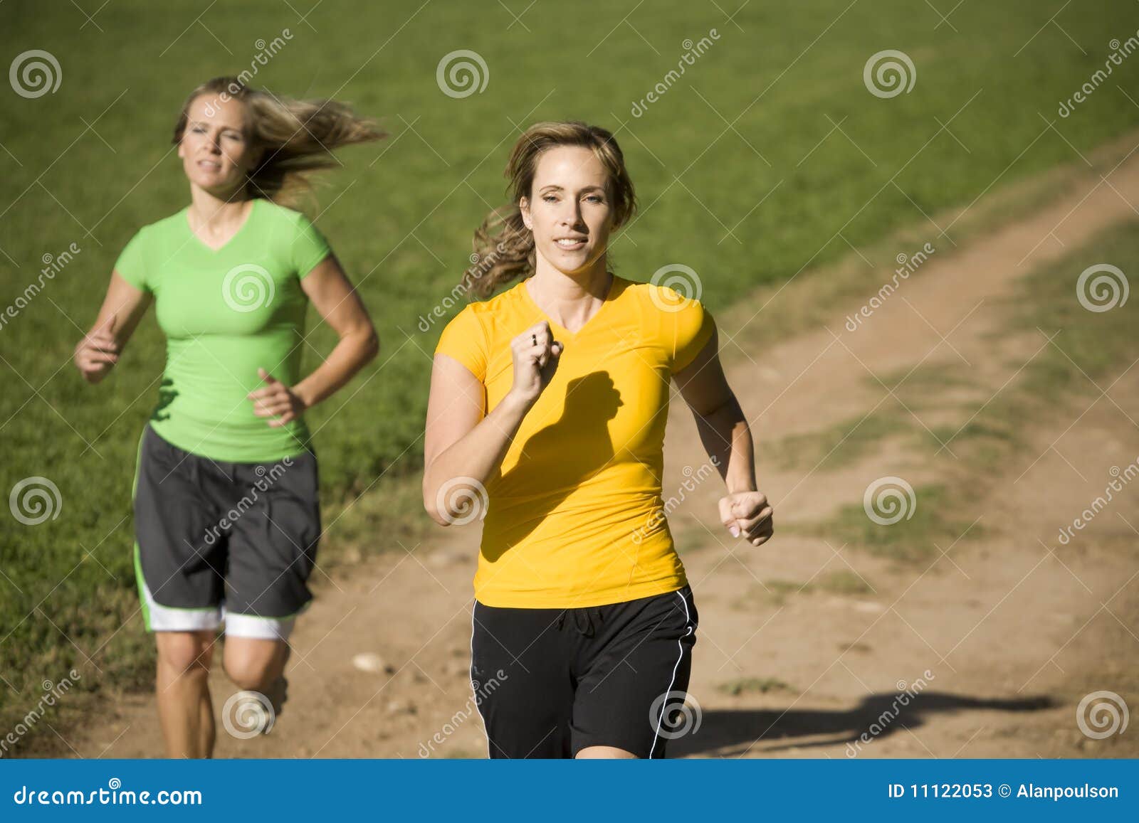 Women Running on Country Road Stock Image - Image of road, yellow: 11122053