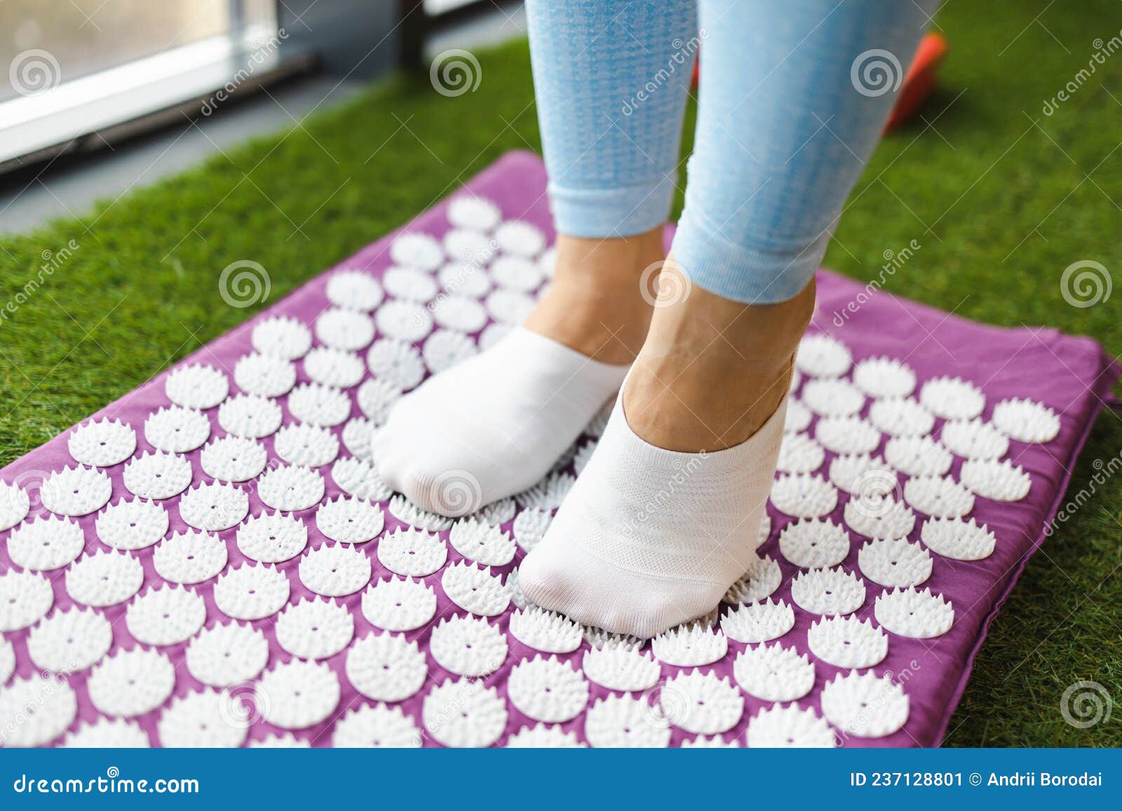 Women`s Feet Stand on a Needle Mat. Stock Image - Image of stand ...