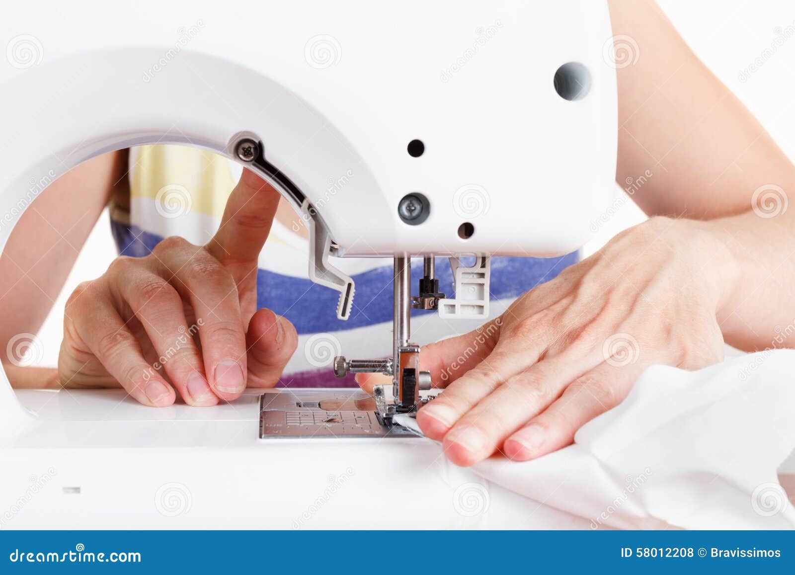 Women S Hands Behind Her Sewing Stock Photo - Image of foot, clothing ...