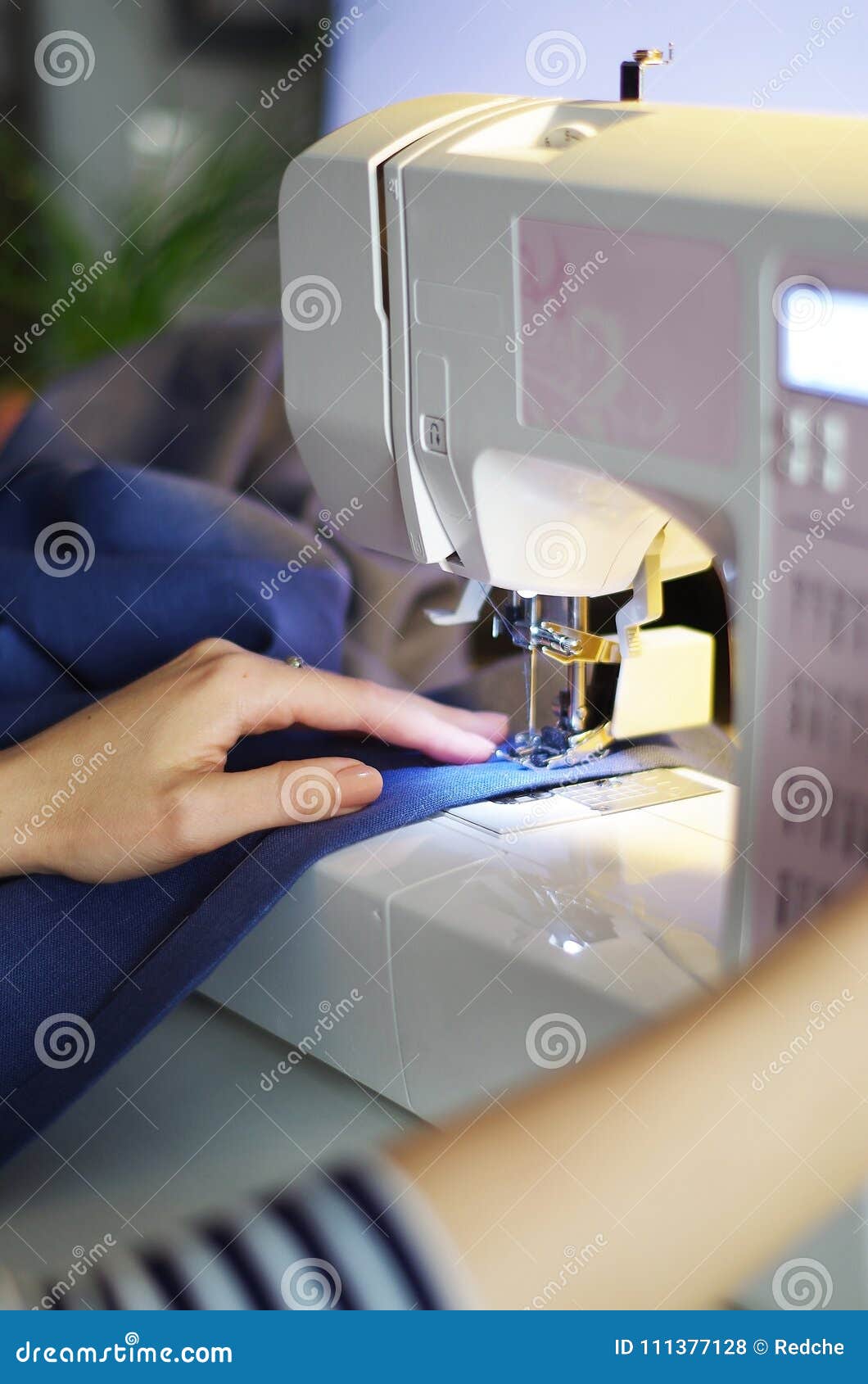 Women`s Hands of Seamstress Using Sewing Machine. Tailoring Proc Stock ...