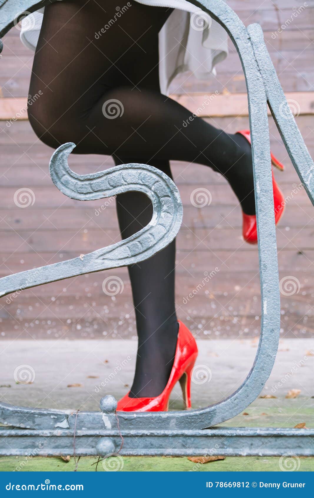 Women S Legs Behind a Railing Stock Photo - Image of beauty, foot: 78669812