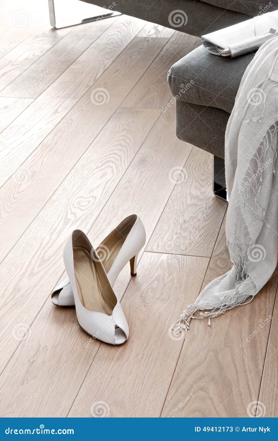 Women S Shoes and Clothes Lying in Front of a Sofa Stock Image - Image ...