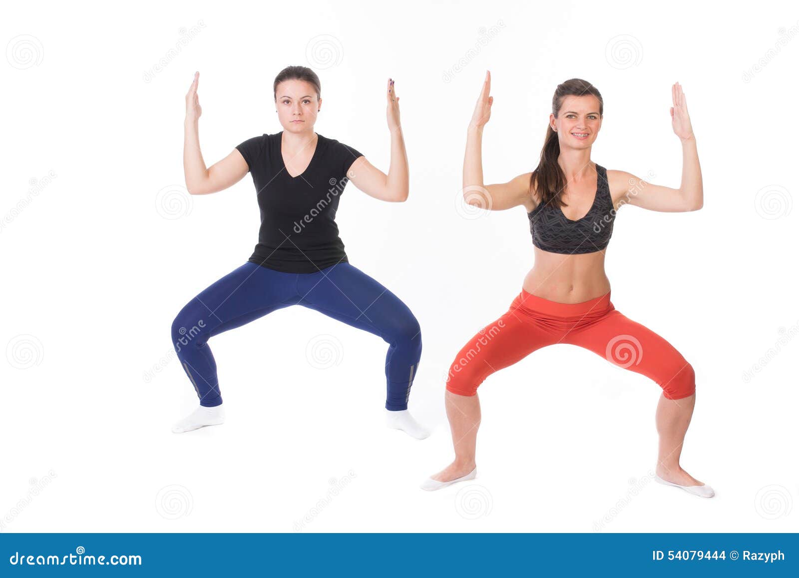 Women in the same pose stock photo. Image of exercise - 54079444