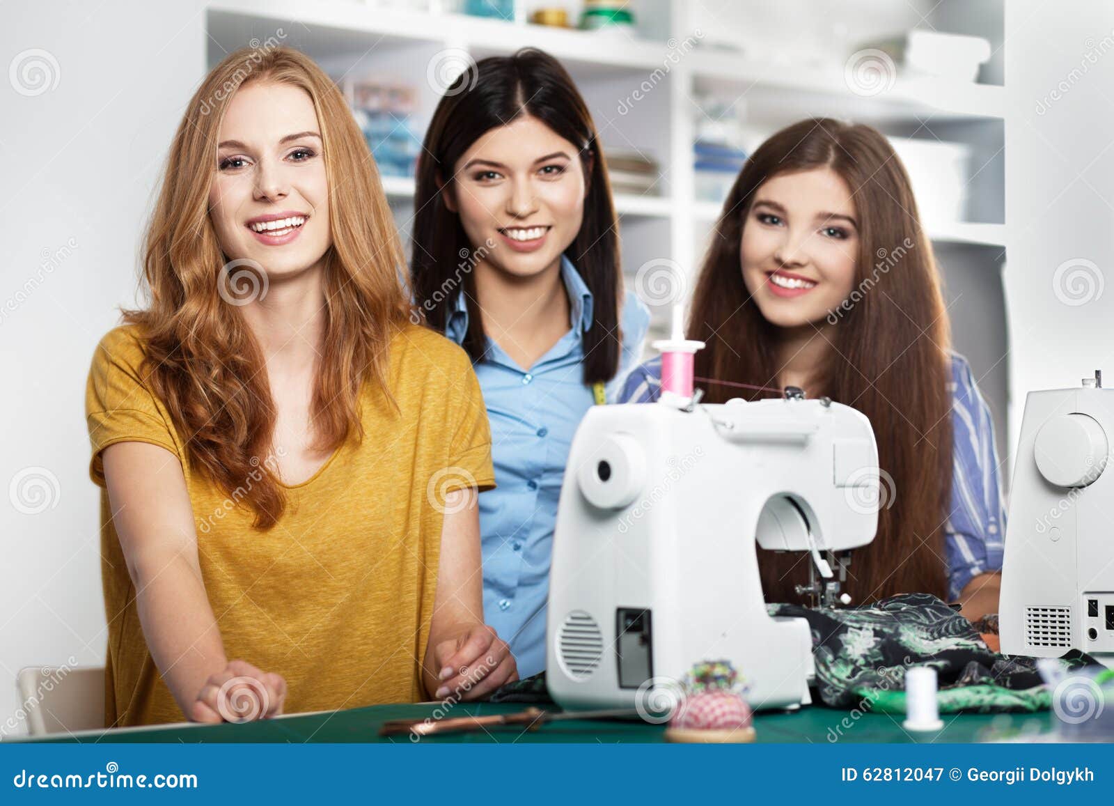 Women in a sewing workshop stock image. Image of creative - 62812047