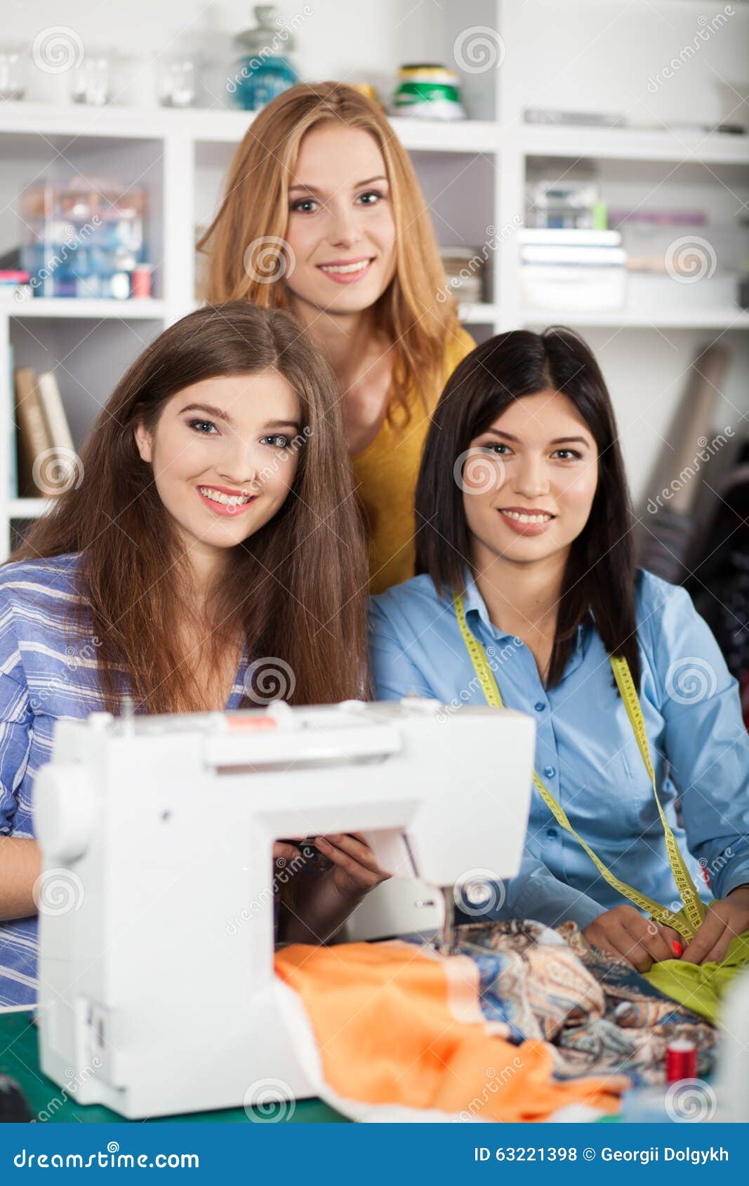 Women in a sewing workshop stock photo. Image of business - 63221398