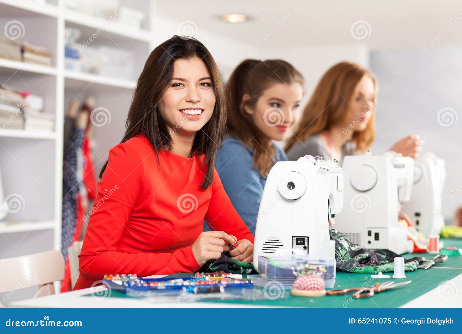 Women in a sewing workshop stock image. Image of beautiful - 65241075