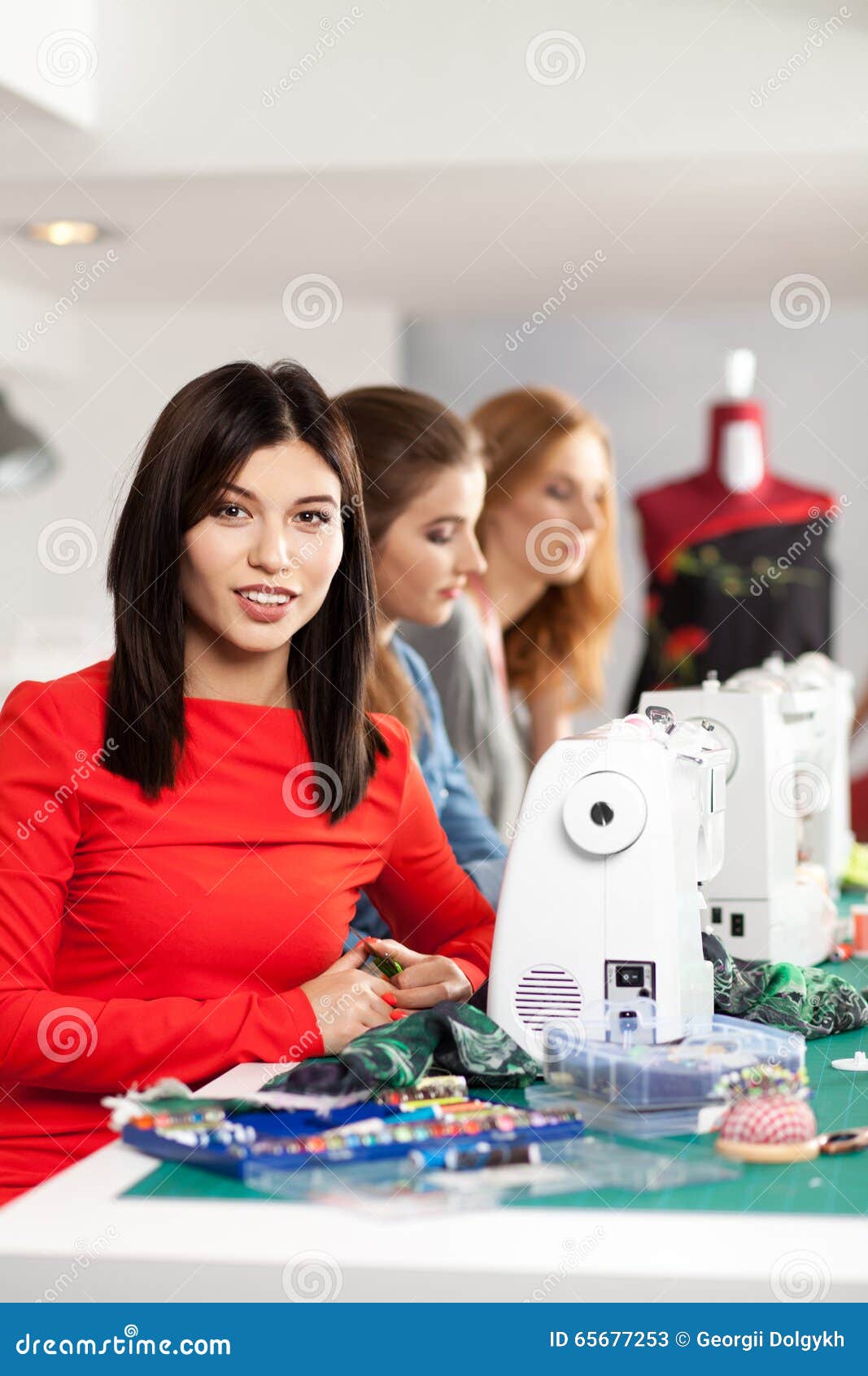 Women in a sewing workshop stock image. Image of creative - 65677253