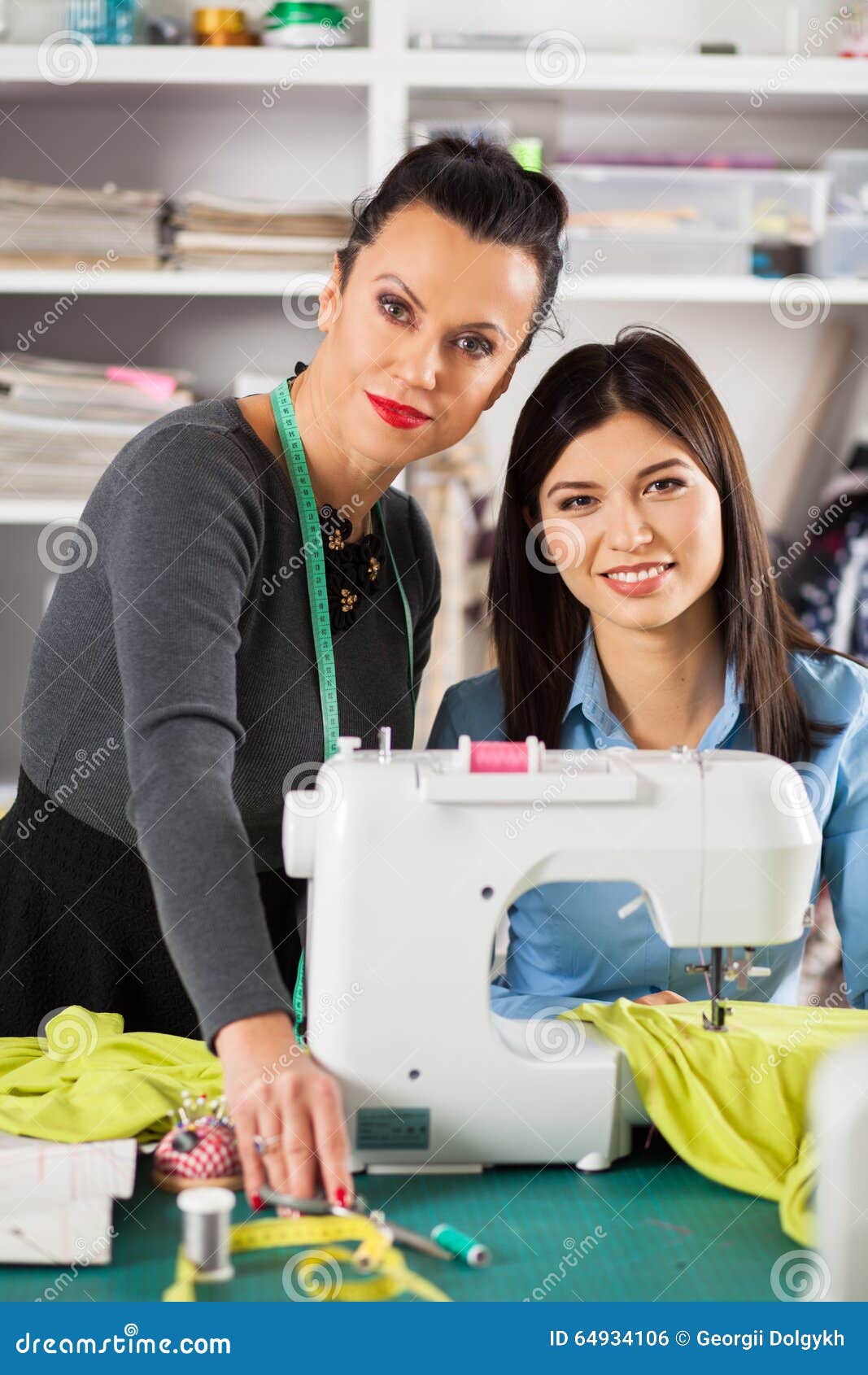 Women in a sewing workshop stock photo. Image of fashion - 64934106