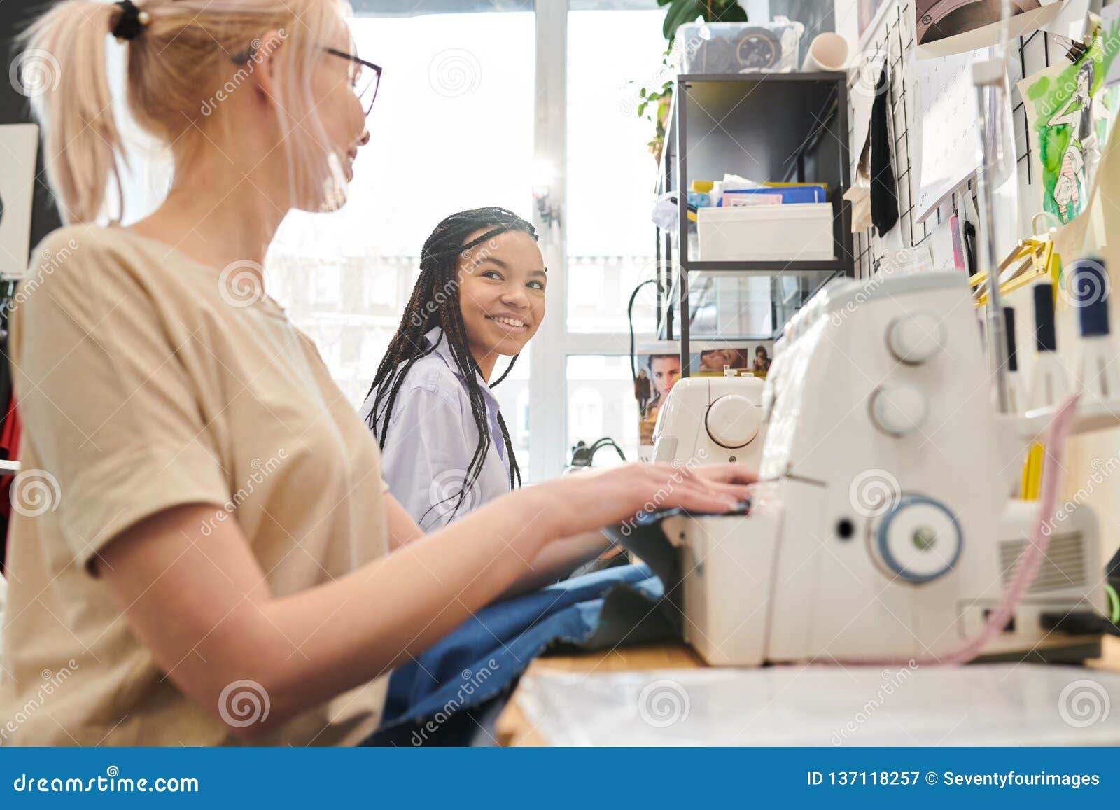 Women sewing in workshop stock image. Image of equipment - 137118257