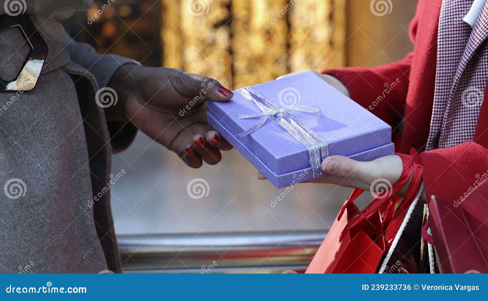 Women Sharing a Gift Box with Bow Stock Photo - Image of away, packet ...