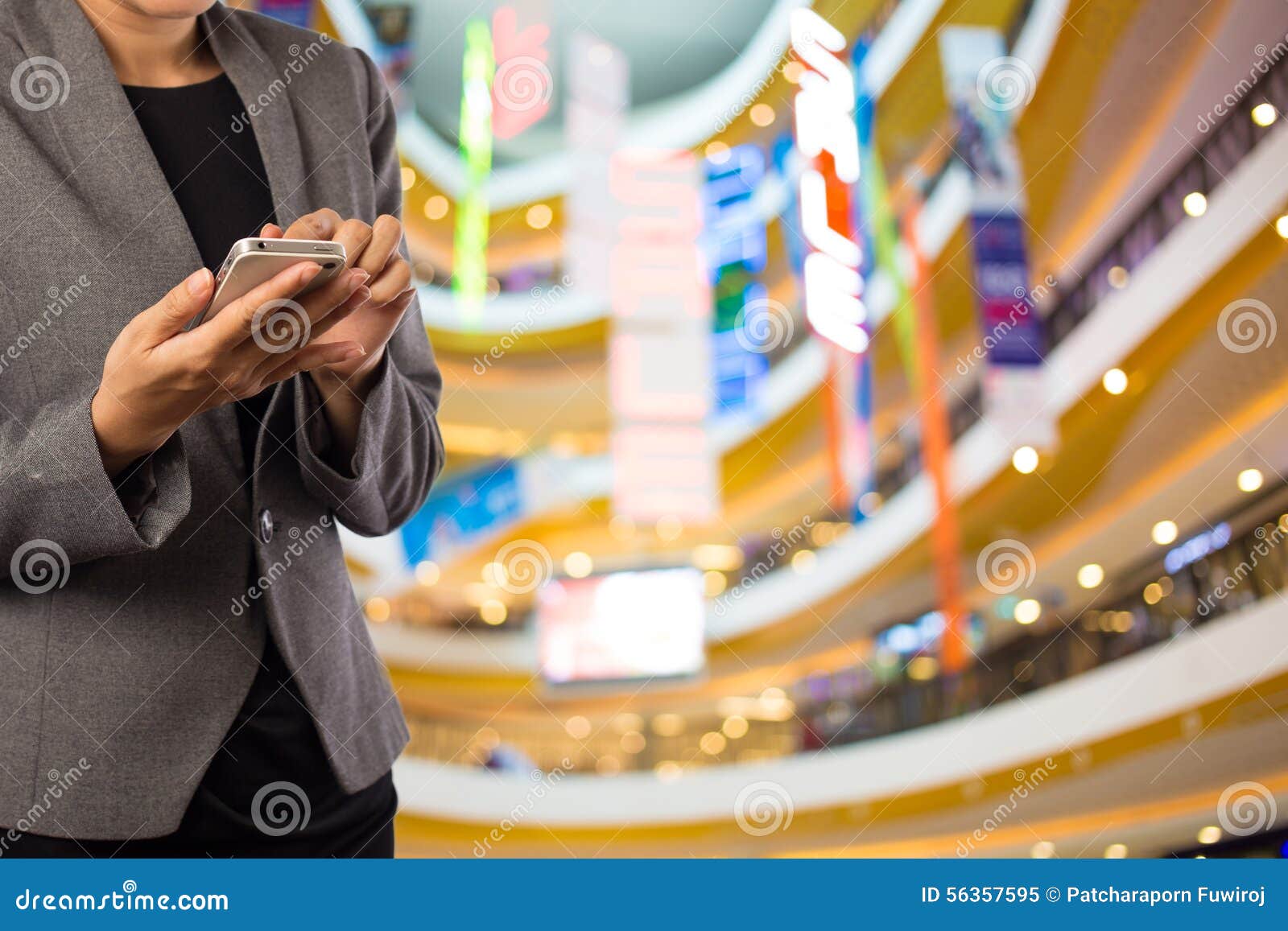 Women in Shopping Mall Using Mobile Phone. Stock Image - Image of ...