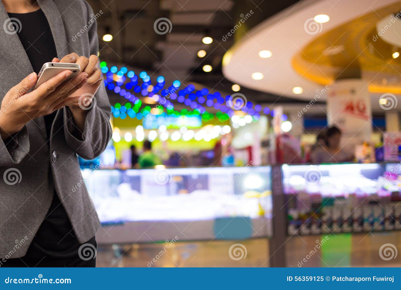 Women in Shopping Mall Using Mobile Phone. Stock Image - Image of woman ...