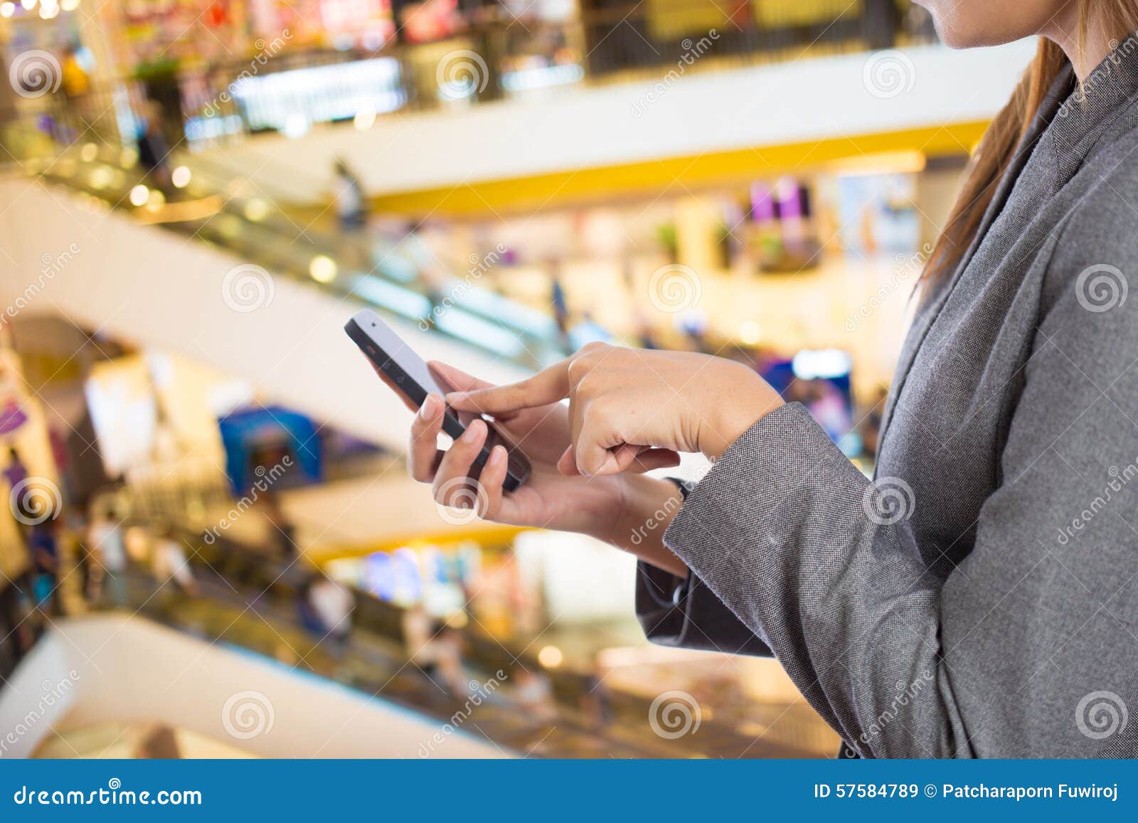 Women in Shopping Mall Using Mobile Phone. Stock Image - Image of cell ...