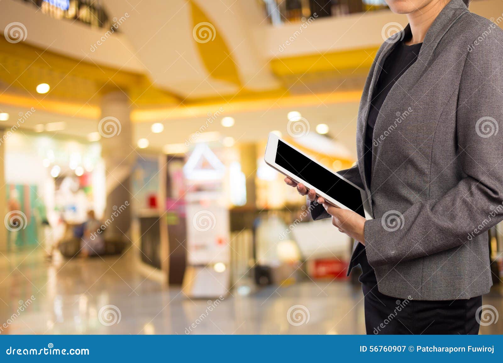 Women in Shopping Mall Using Mobile Tablet PC. Stock Image - Image of ...