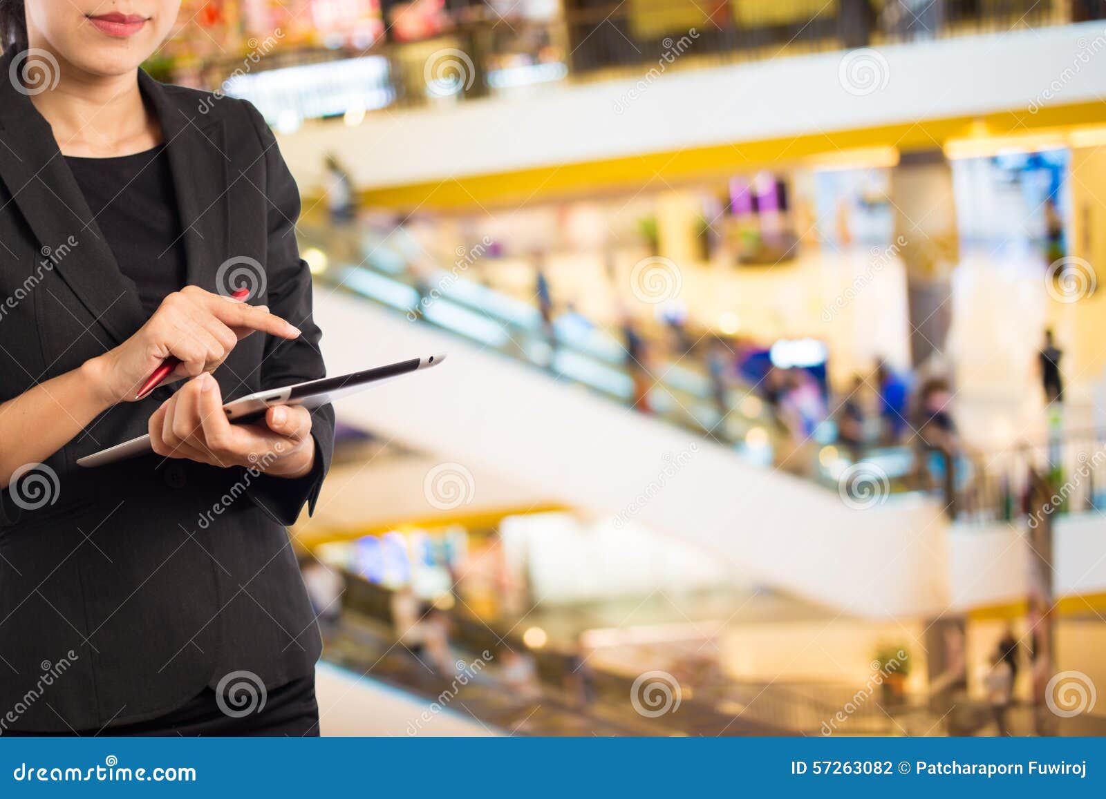 Women in Shopping Mall Using Mobile Tablet PC. Stock Photo - Image of ...