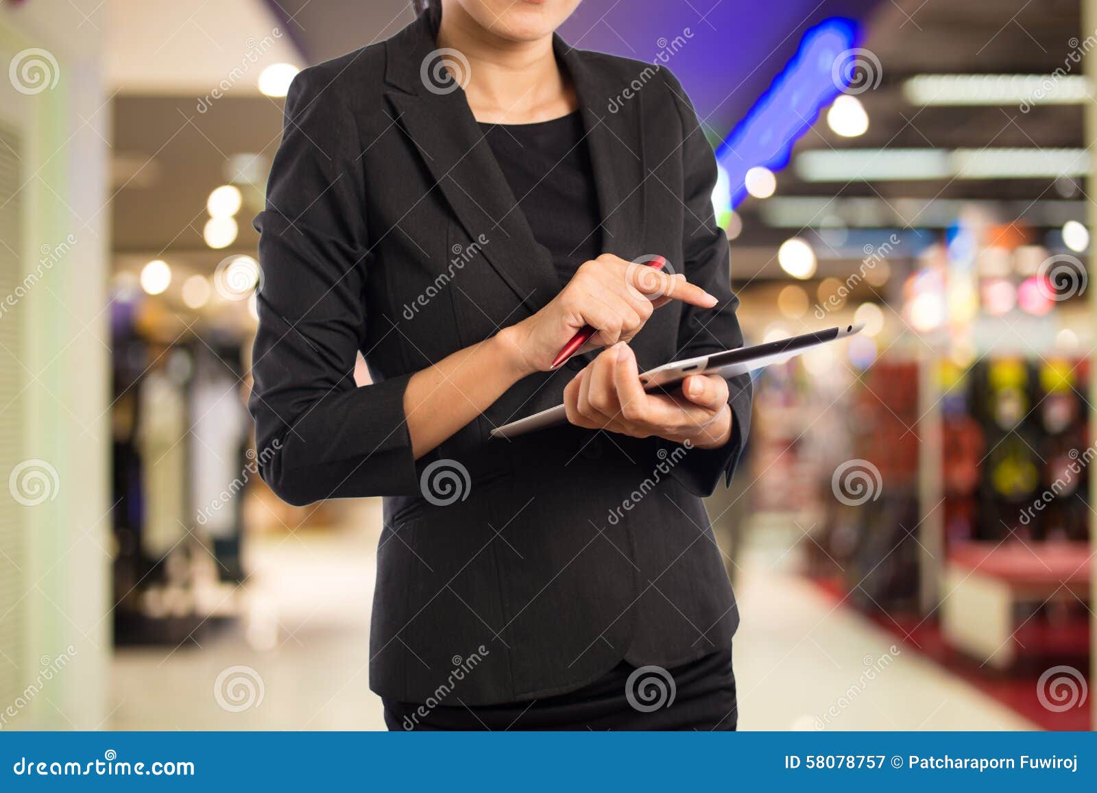 Women in Shopping Mall Using Mobile Tablet PC. Stock Image - Image of ...
