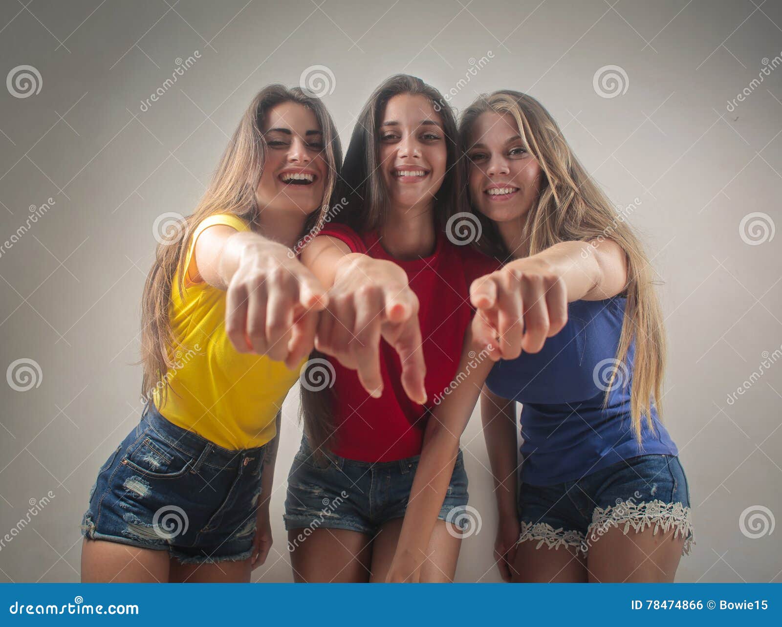 Women are Showing Something Stock Photo - Image of young, happy: 78474866