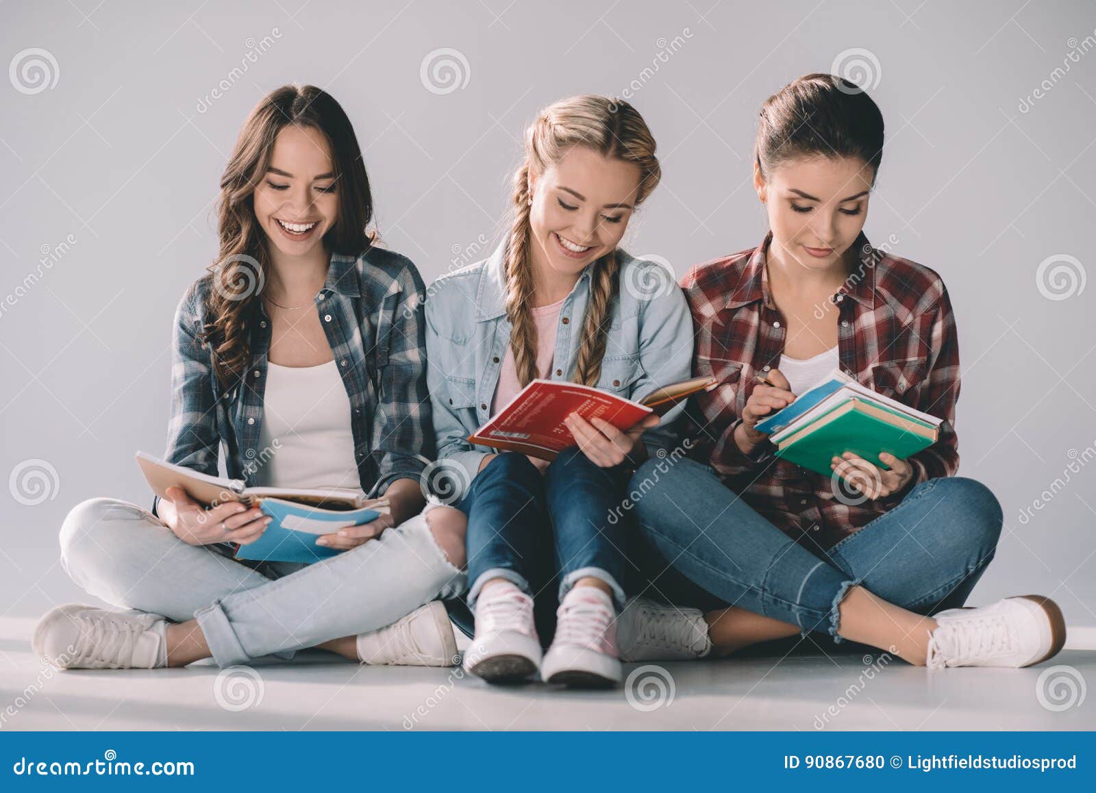 Women Students with Textbooks Studying Together Stock Photo - Image of ...