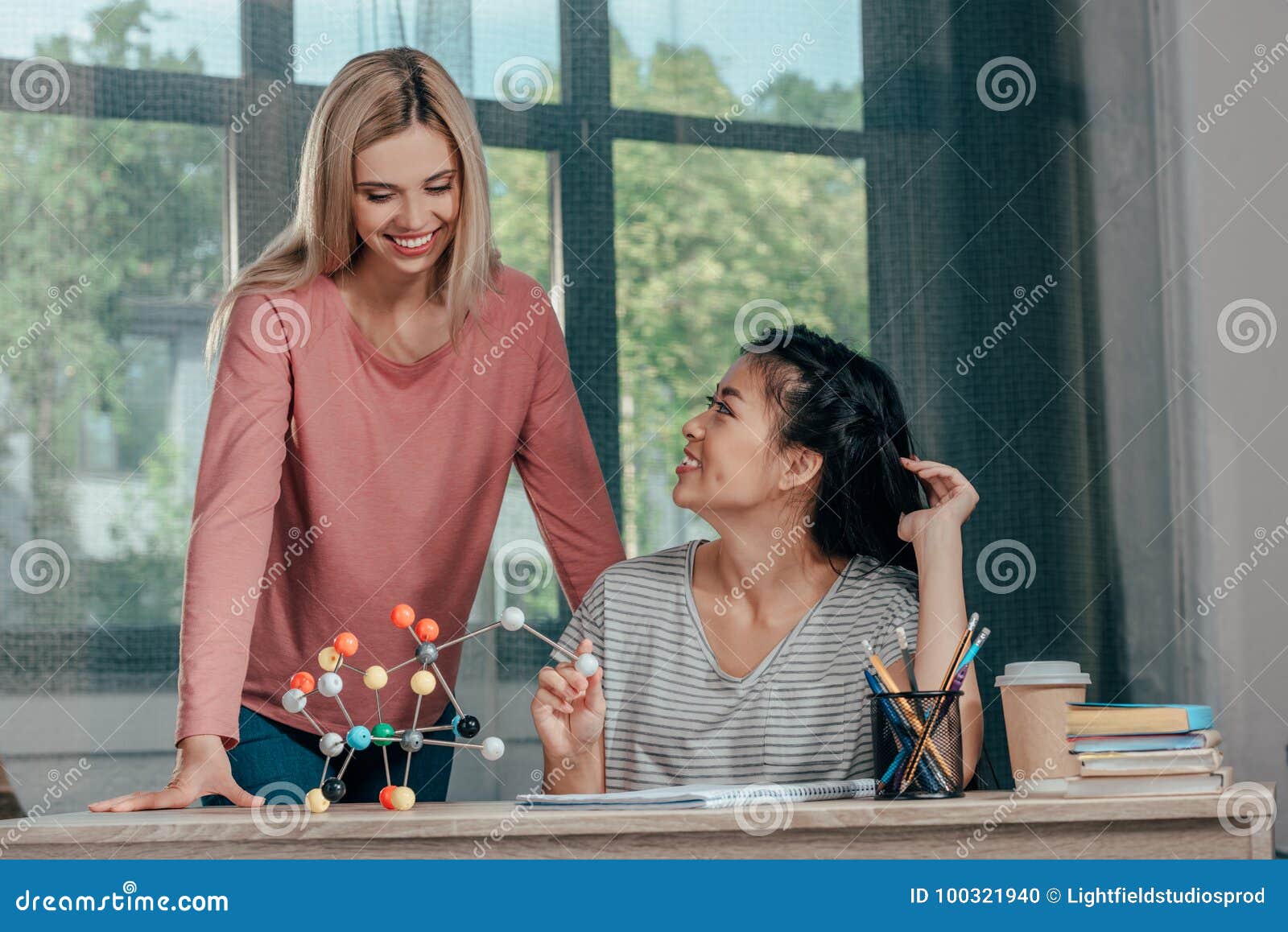 Women Studying with Chemistry Model Stock Photo - Image of studying ...
