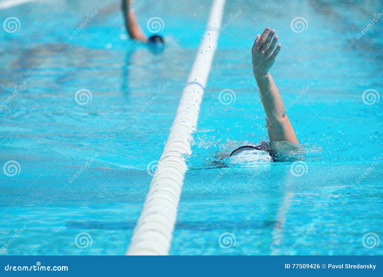 Women Swimming Backstroke in a Race Stock Photo - Image of splashing ...