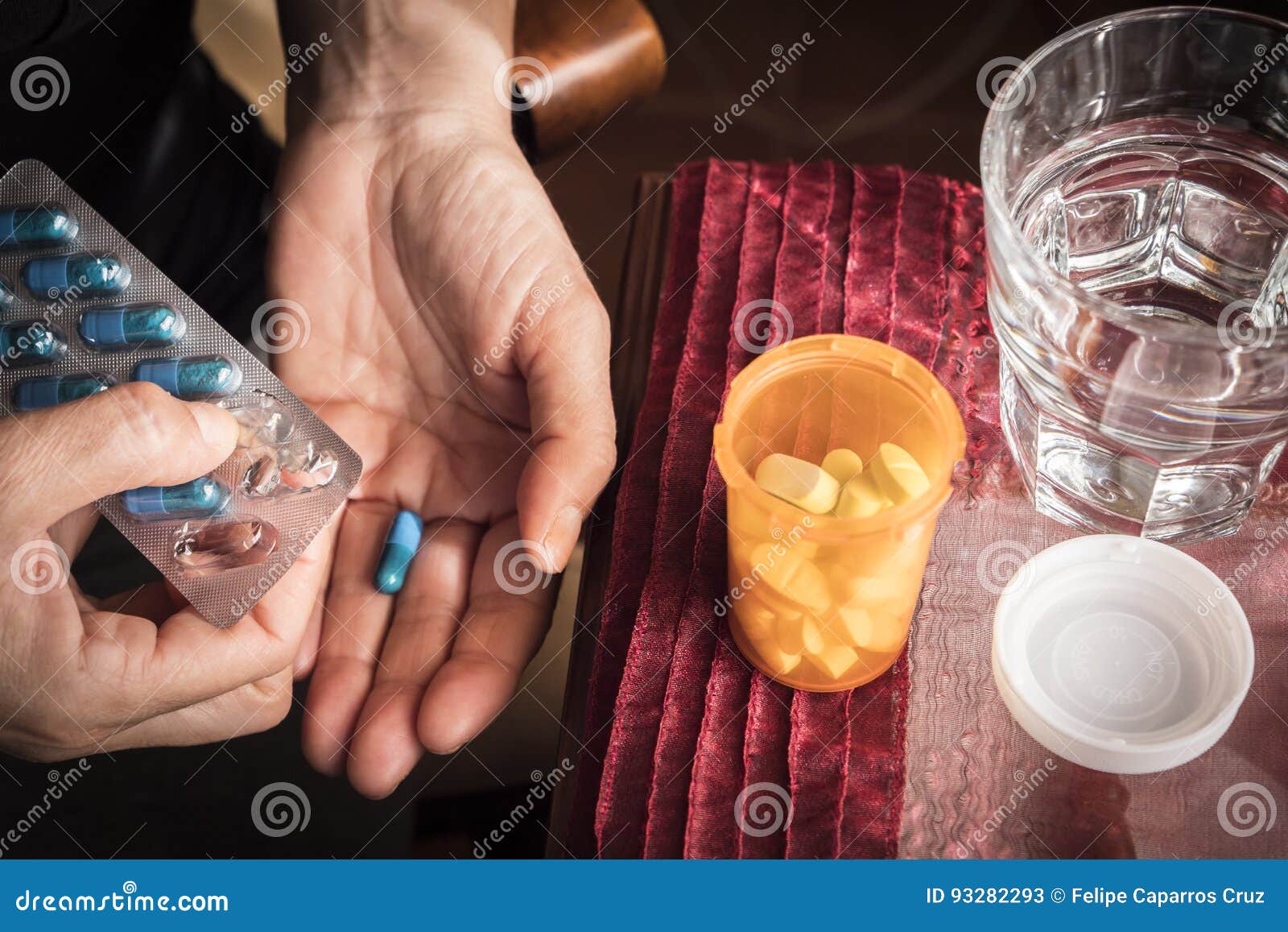 Women Take Blue Capsule with Left Hand Stock Image - Image of capsule ...