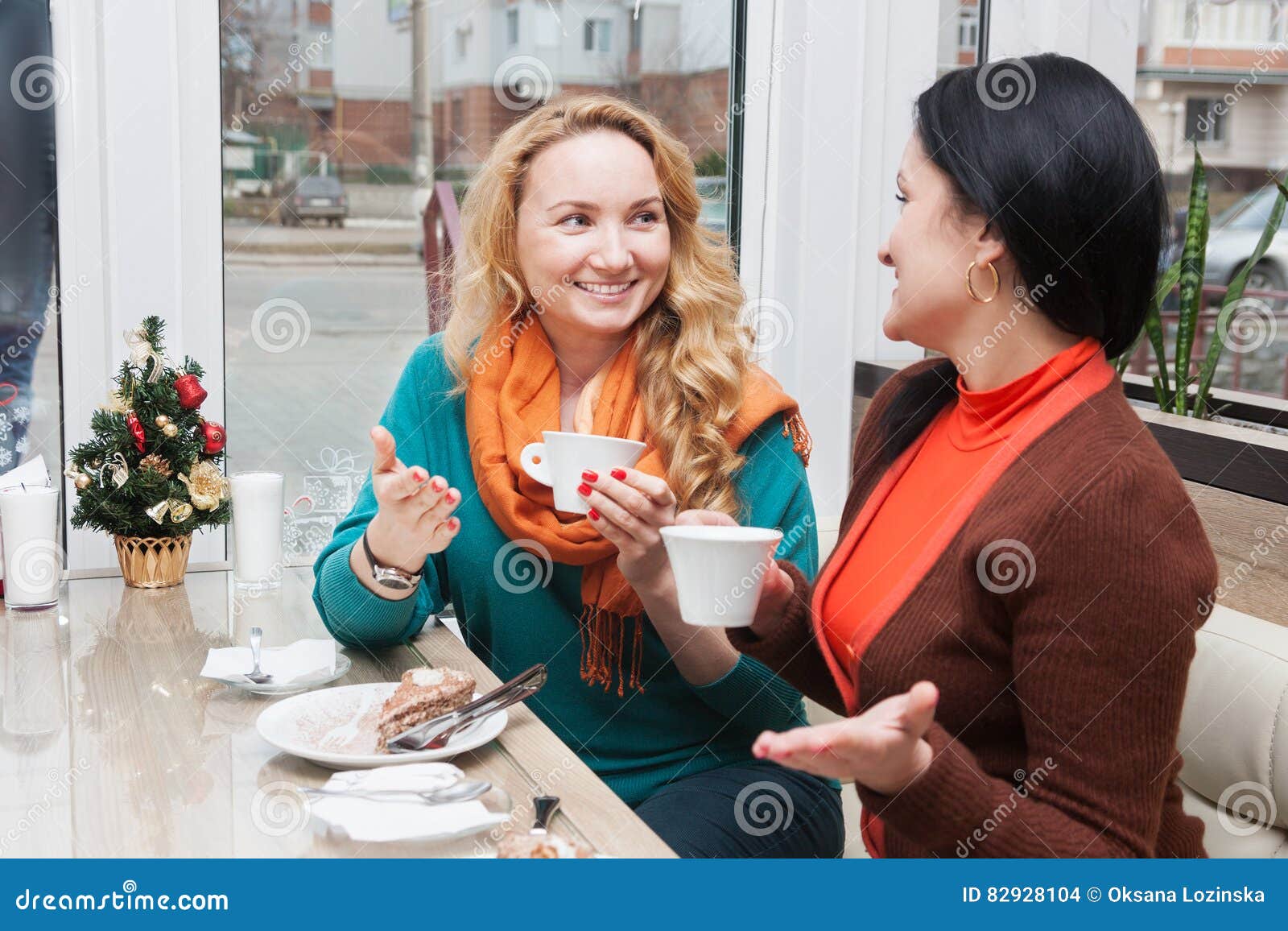 Women talking in coffee stock photo. Image of coffee - 82928104
