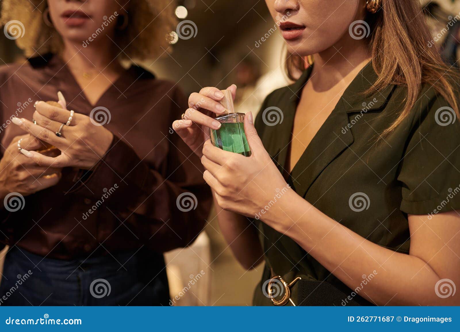 Women Testing New Perfumes stock image. Image of fashion - 262771687