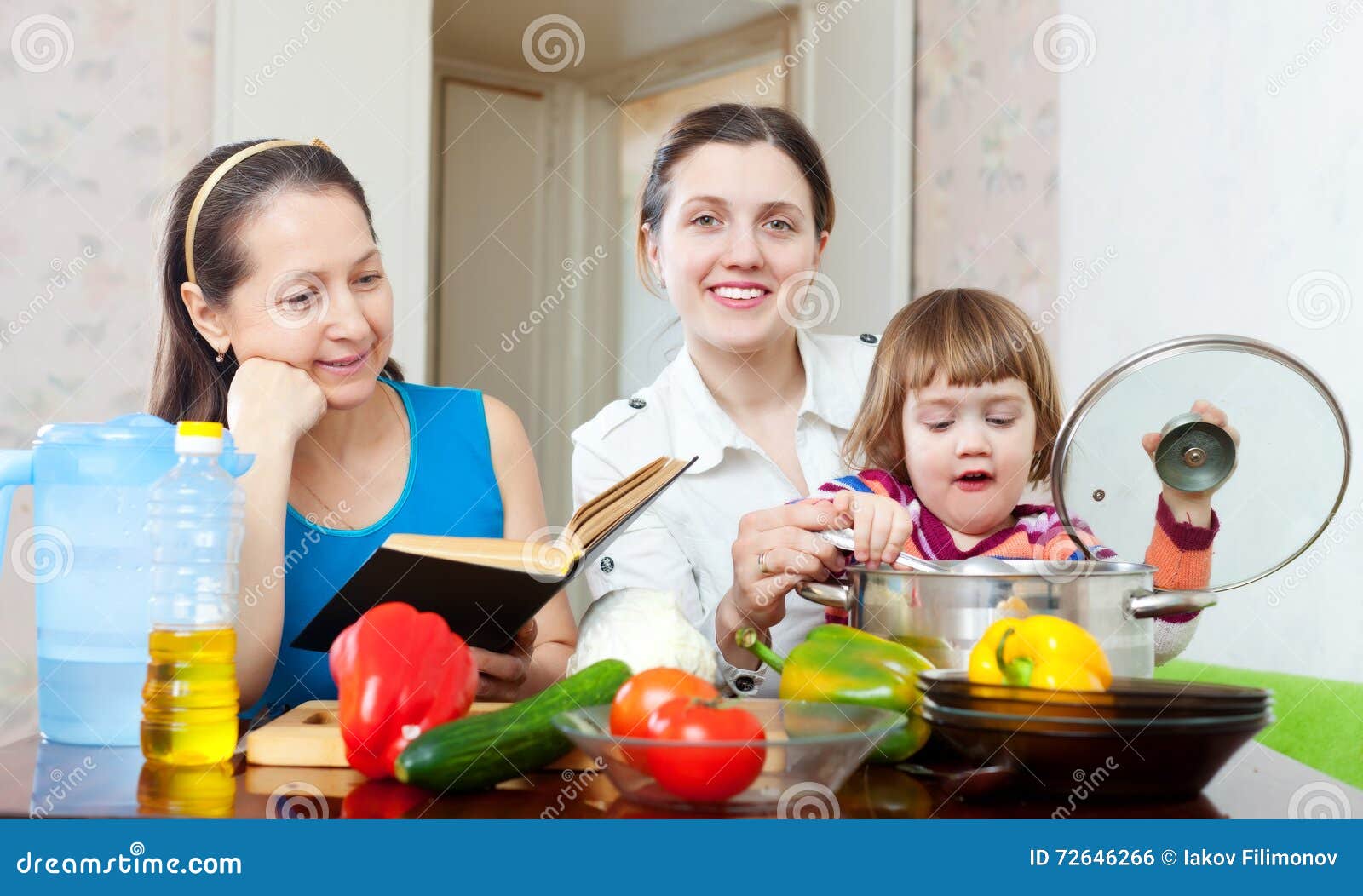 Women of Three Generations Cook with Cookbook Stock Photo - Image of ...