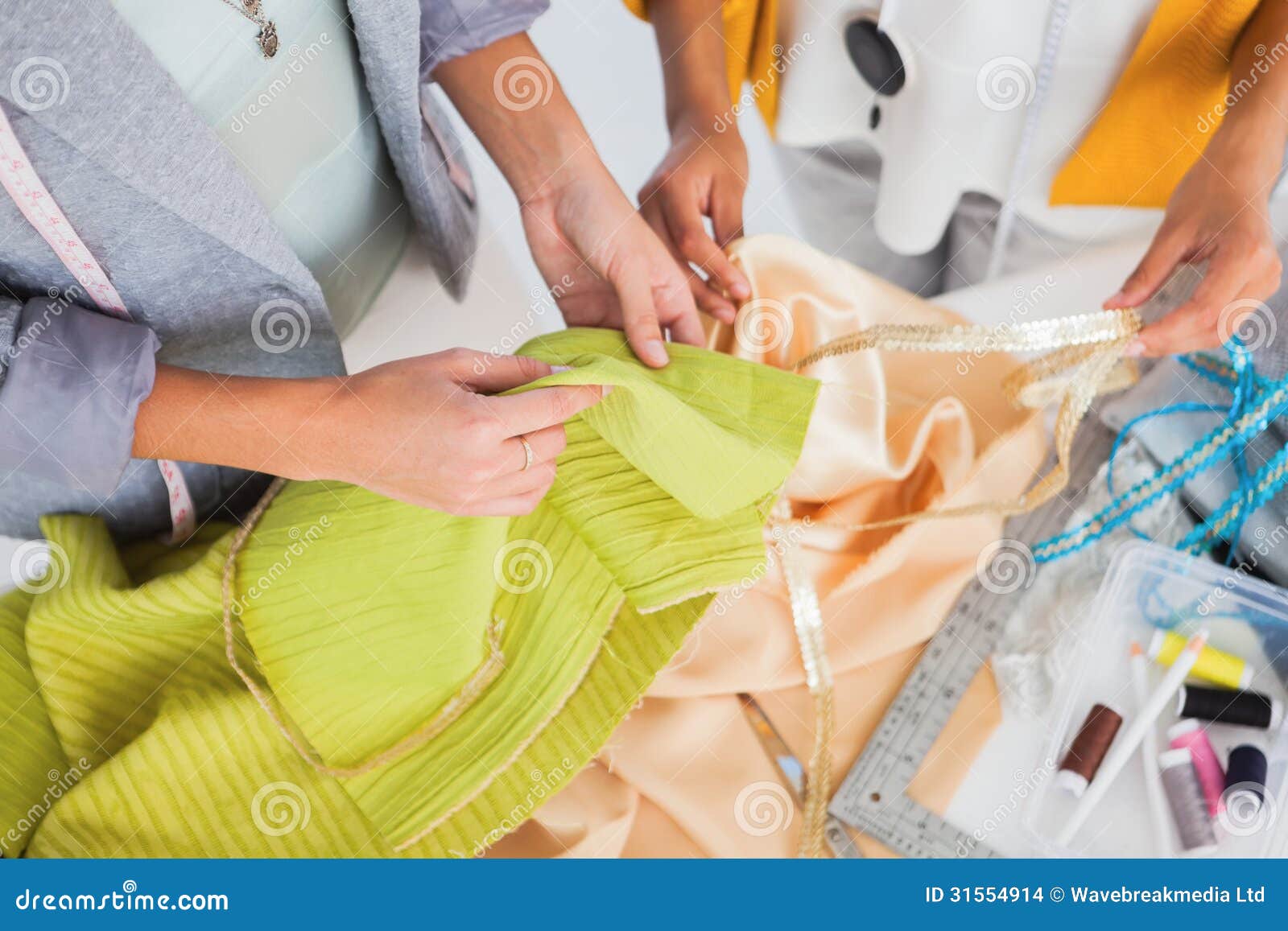 Women touching textile stock photo. Image of designer - 31554914
