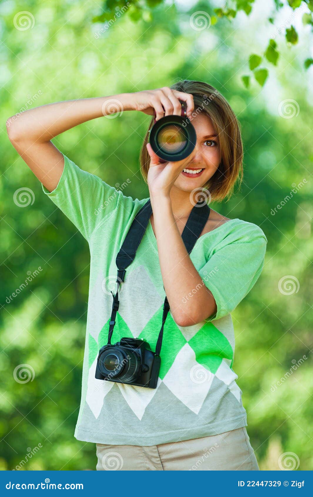 Women with two cameras stock image. Image of background - 22447329