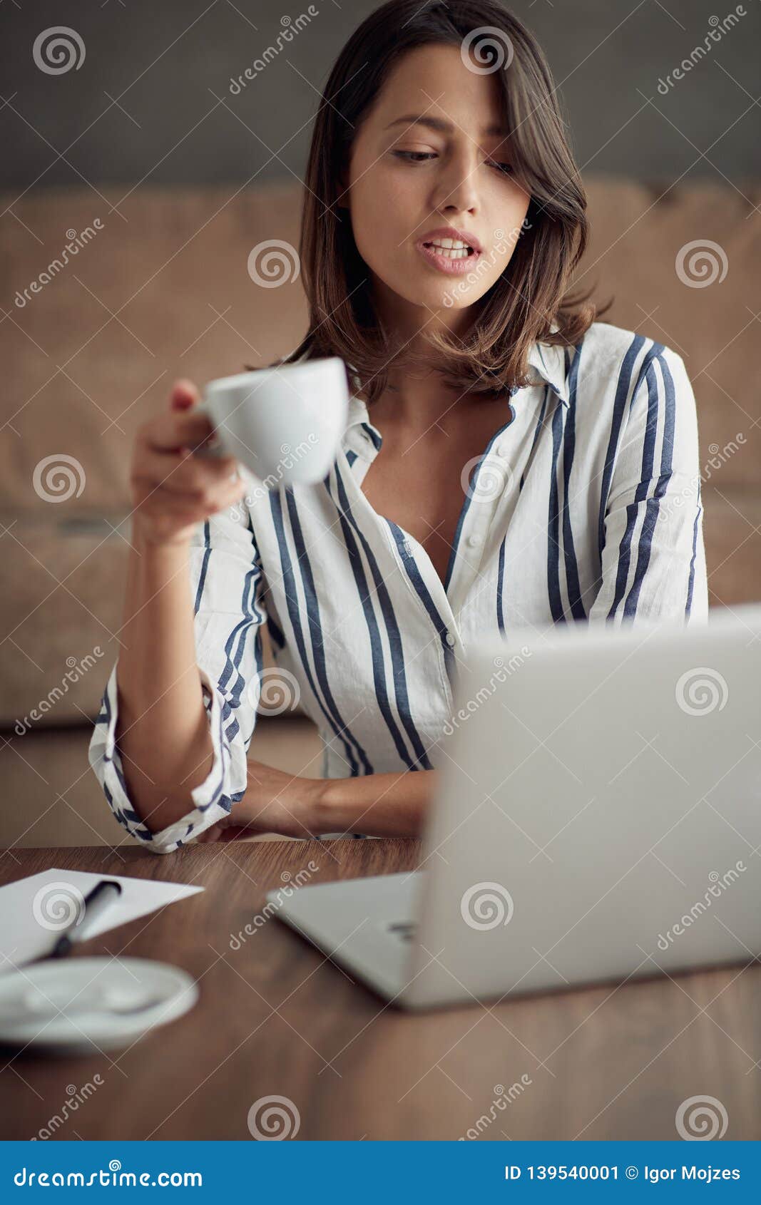 Women Using Laptop Computer and Drinking Coffee Stock Image - Image of ...